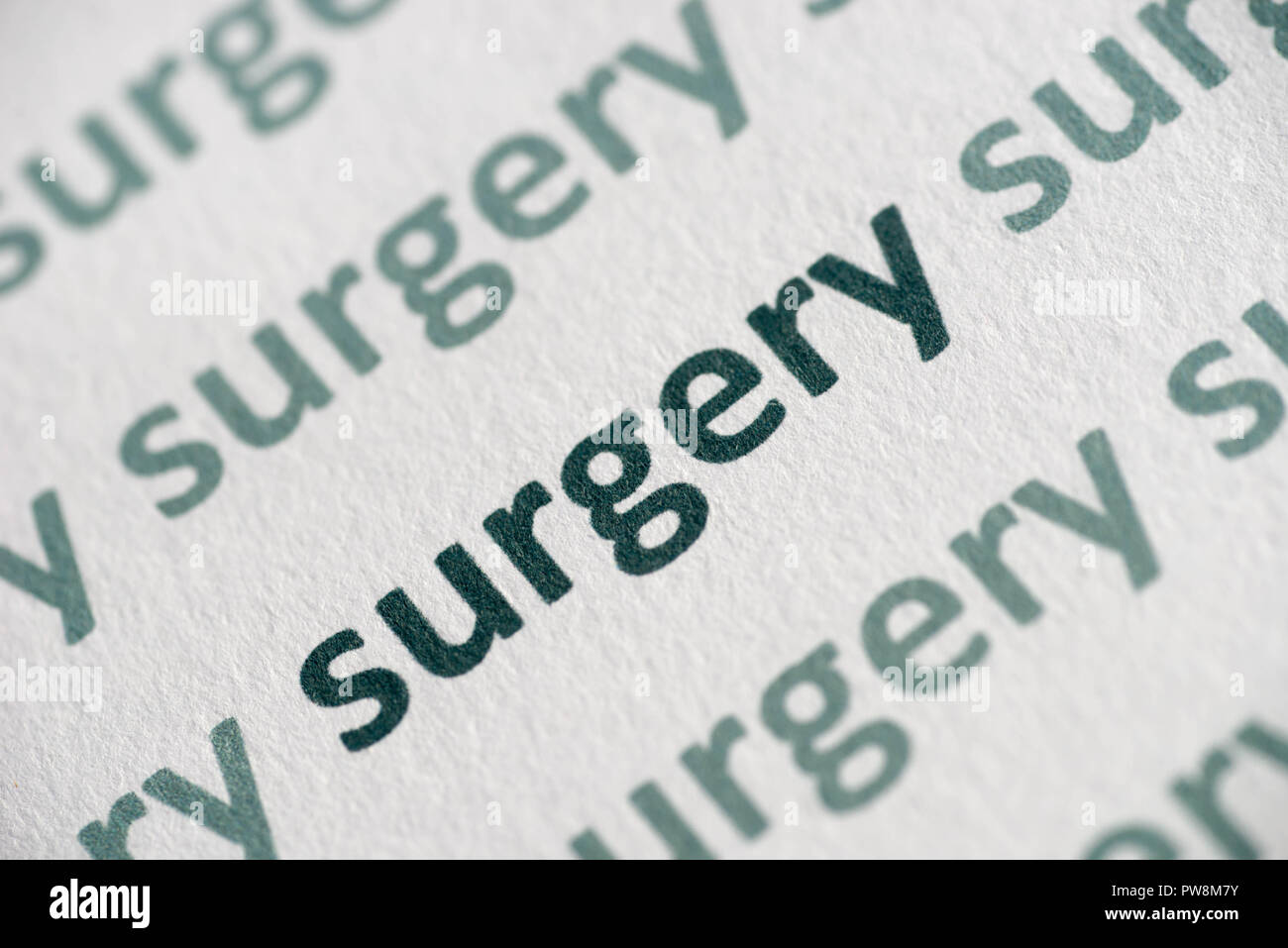 word surgery printed on white paper macro Stock Photo - Alamy