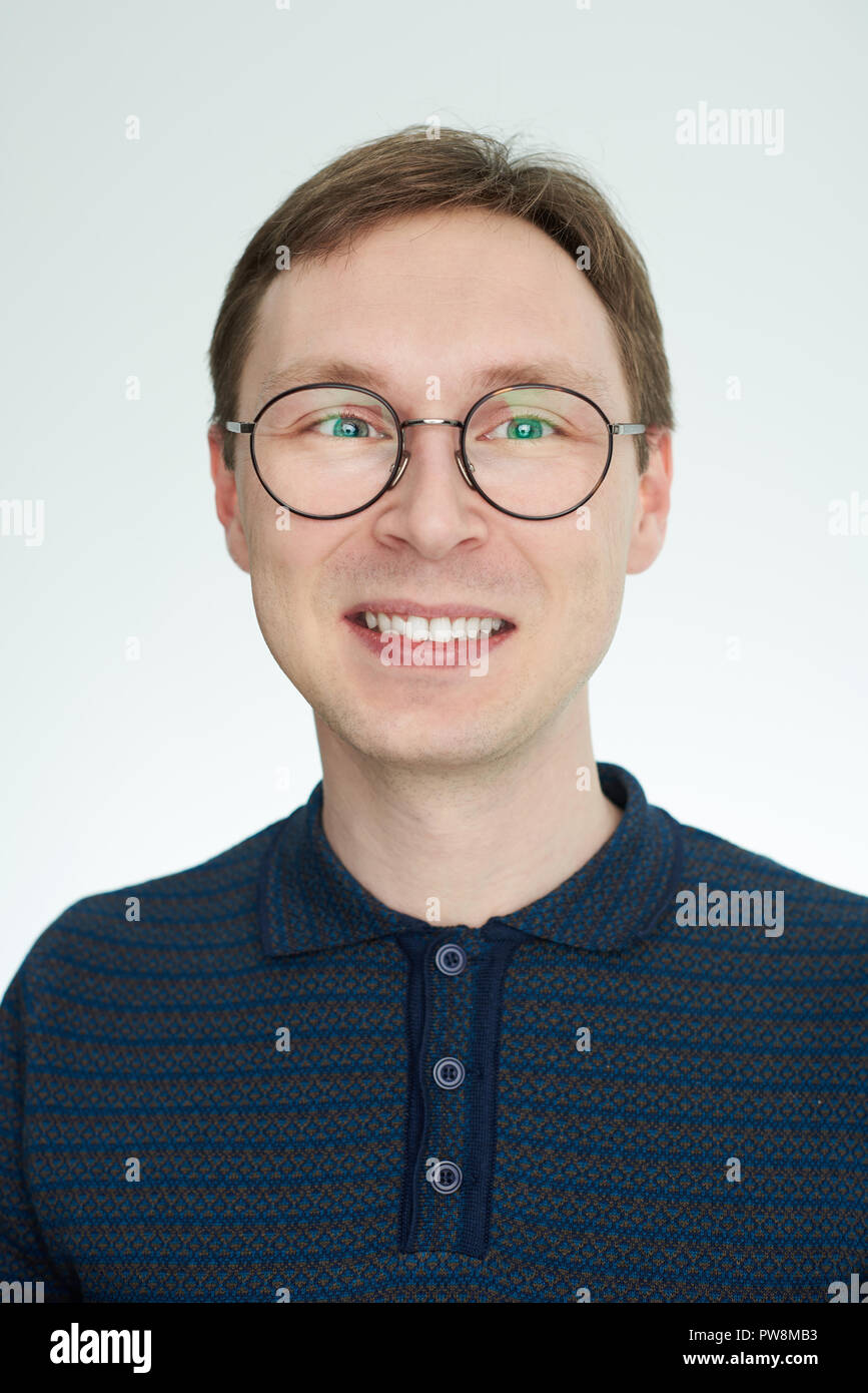 Happy smiling young caucasian man portrait isolated on white background ...