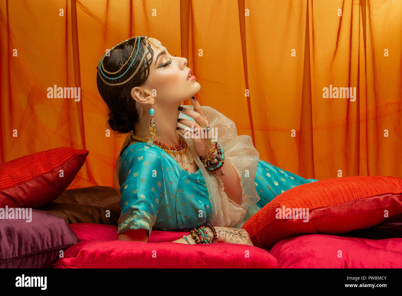 beautiful arabic style bride in ethnic clothes Stock Photo - Alamy