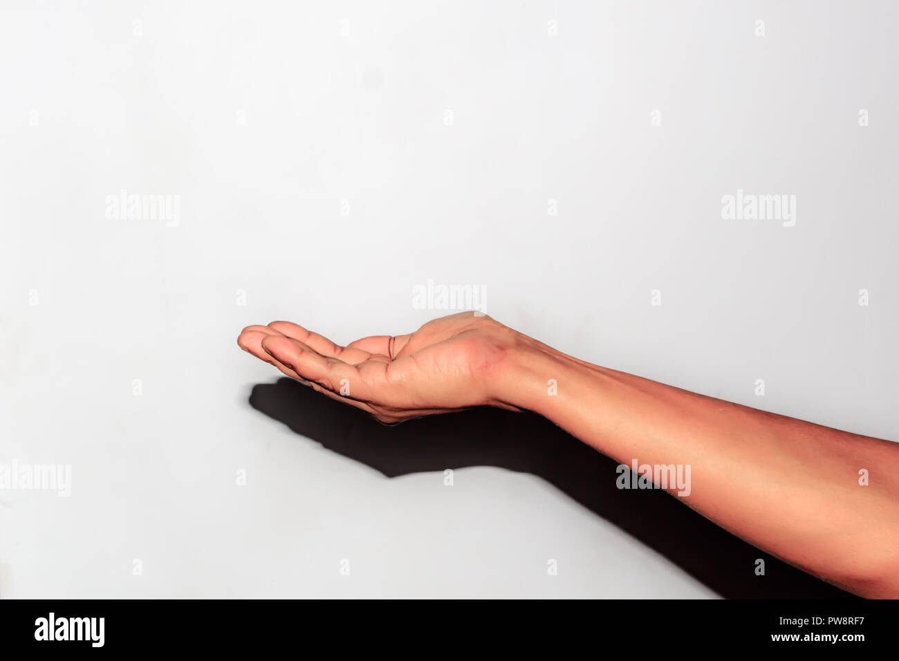 Hand hold virtual objects, isolated on white background. Close up Hand ...