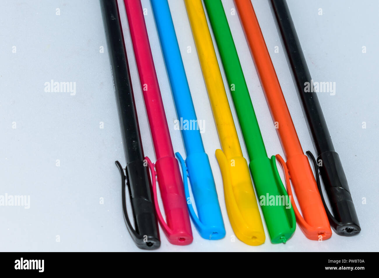 Set of multi-colored pens, tools for writing drawing, isolated on white ...