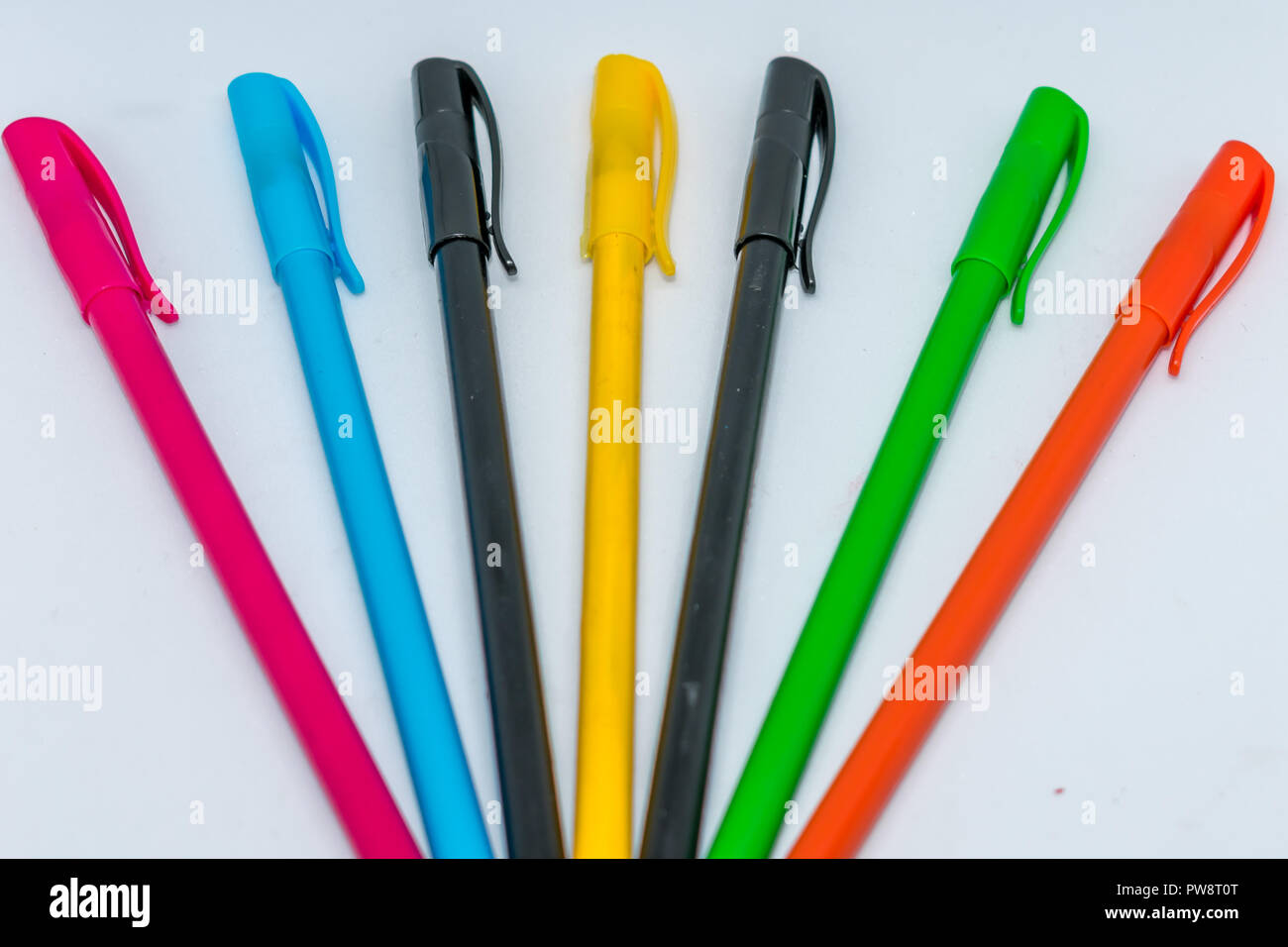 Set of multi-colored pens, tools for writing drawing, isolated on white ...
