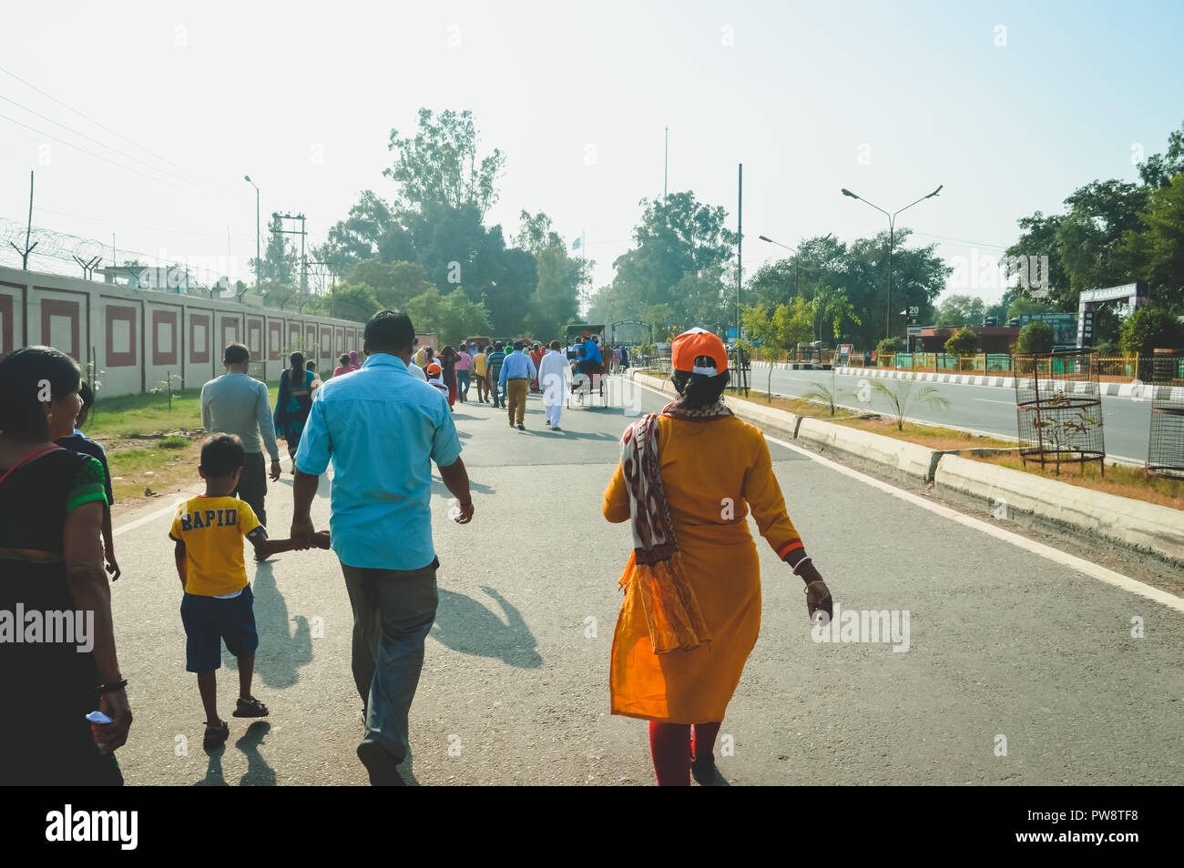 WAGHA BORDER, AMRITSAR, PUNJAB, INDIA - JUNE, 2017. People going to ...