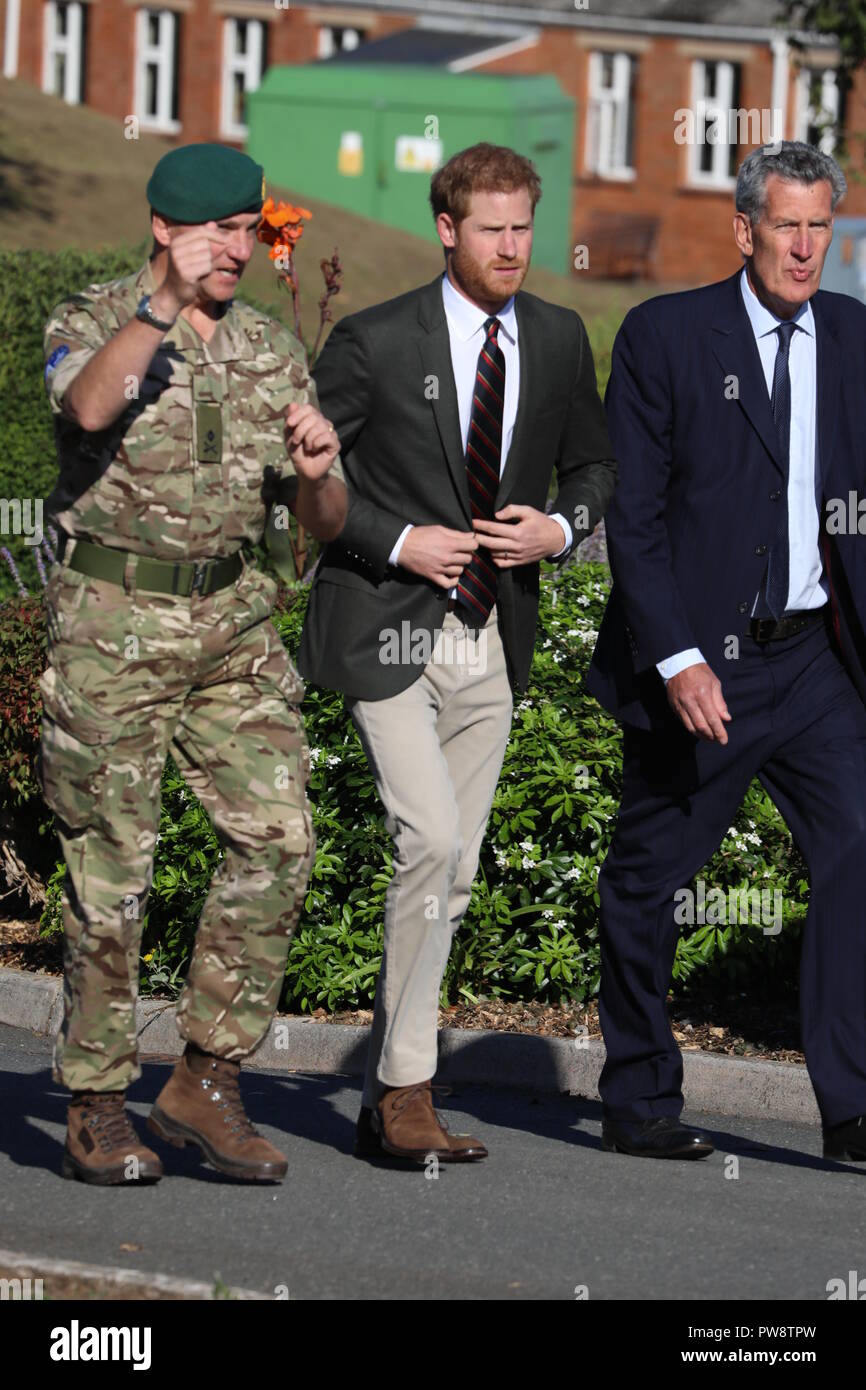 Prince Harry arrives by helicopter at Commando Training Centre Royal ...