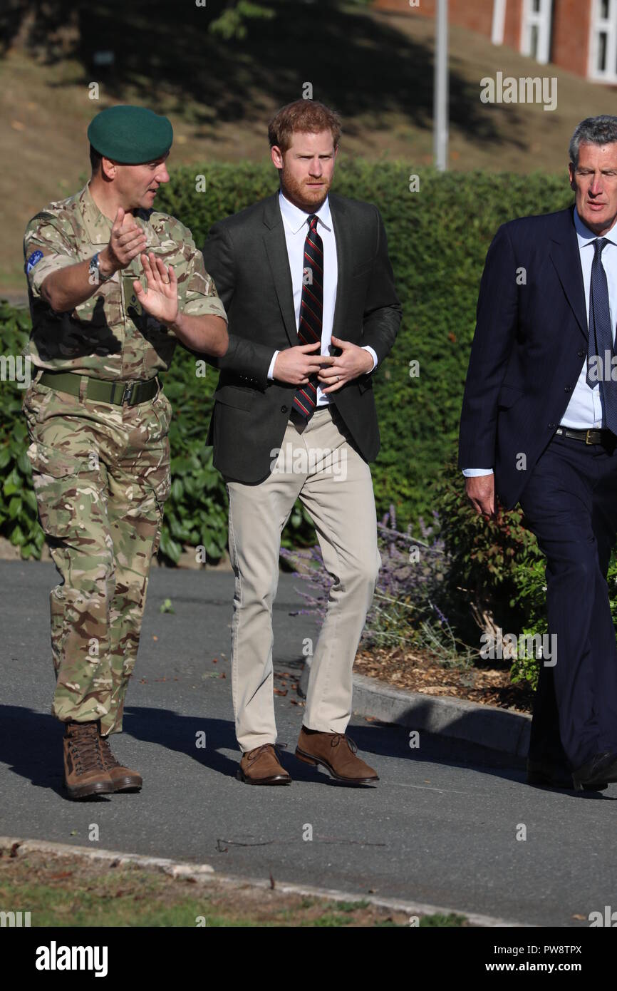 Prince Harry arrives by helicopter at Commando Training Centre Royal ...