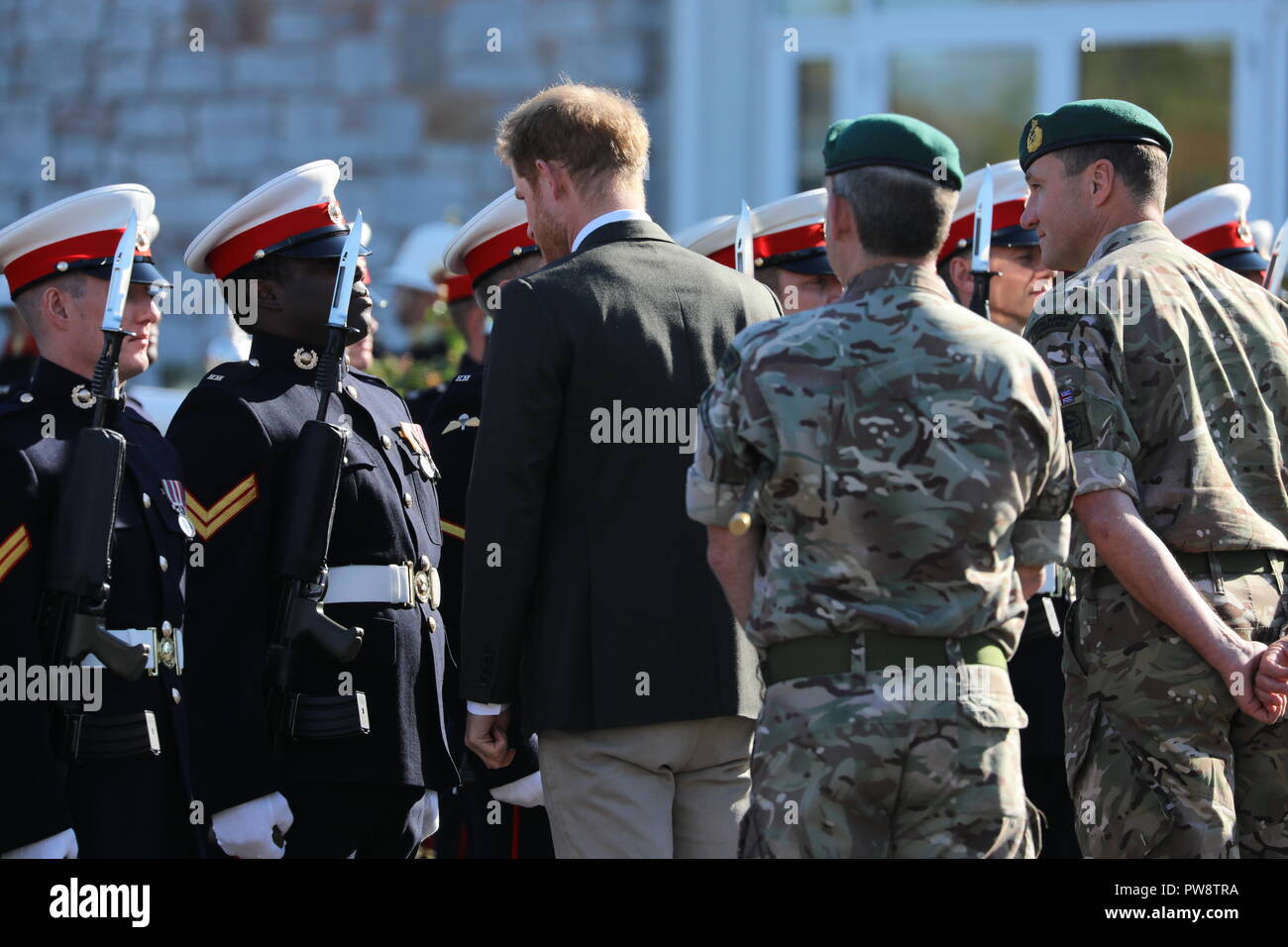 Prince Harry arrives by helicopter at Commando Training Centre Royal ...