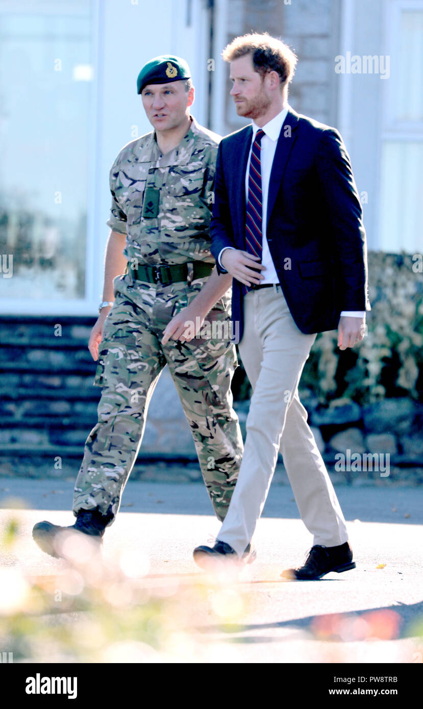 Prince Harry arrives by helicopter at Commando Training Centre Royal ...