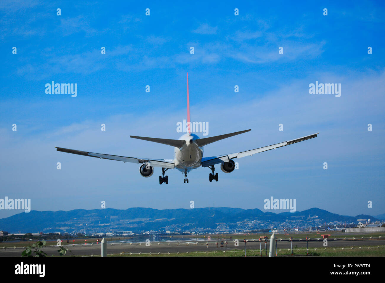 Airplane at Itami Airport Stock Photo - Alamy