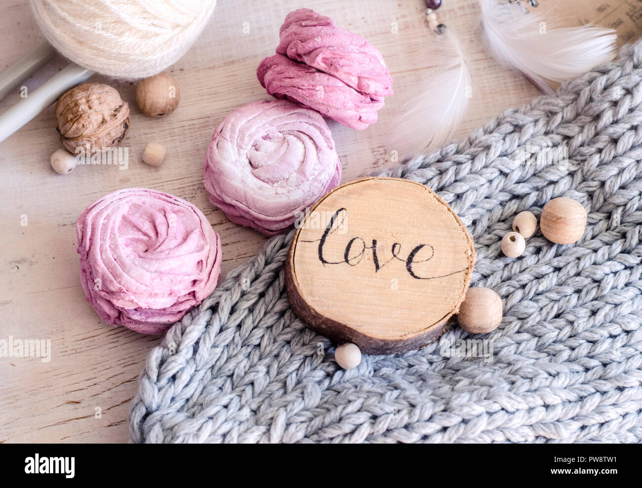 Homemade pink berry marshmallow. Composition with the inscription Love ...
