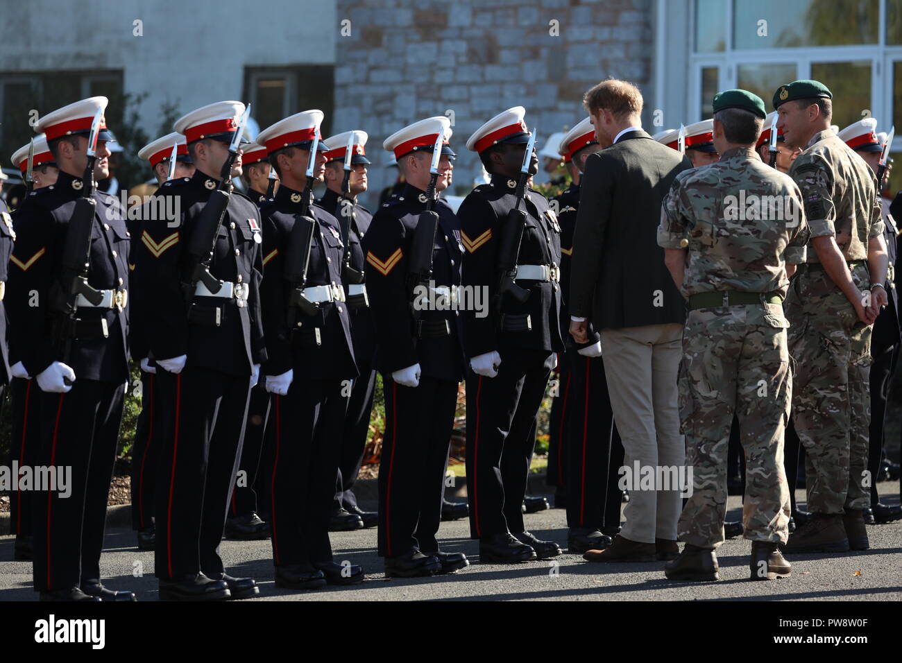 Prince Harry arrives by helicopter at Commando Training Centre Royal ...