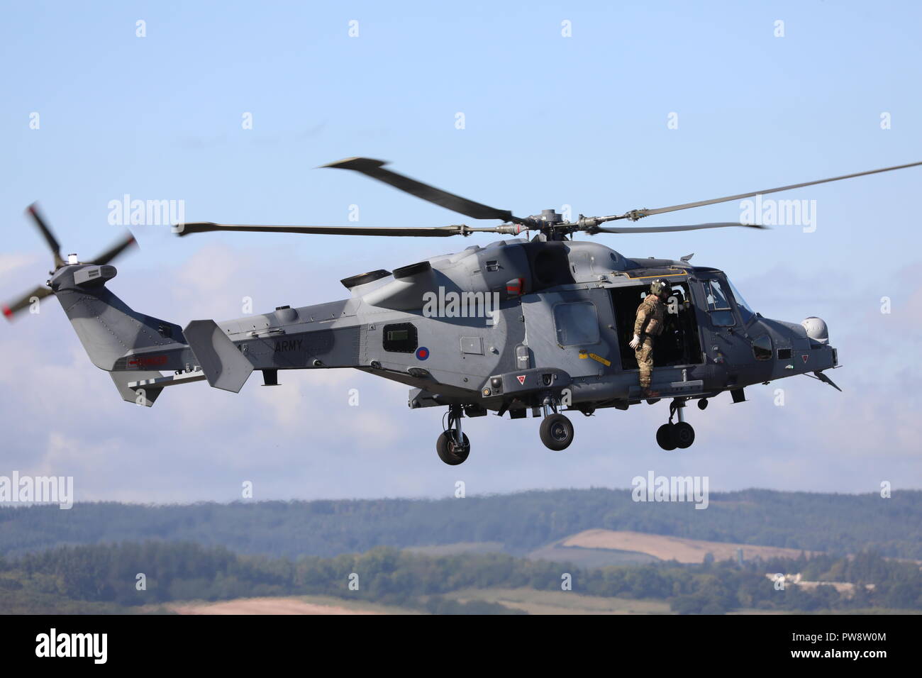 Prince Harry arrives by helicopter at Commando Training Centre Royal ...