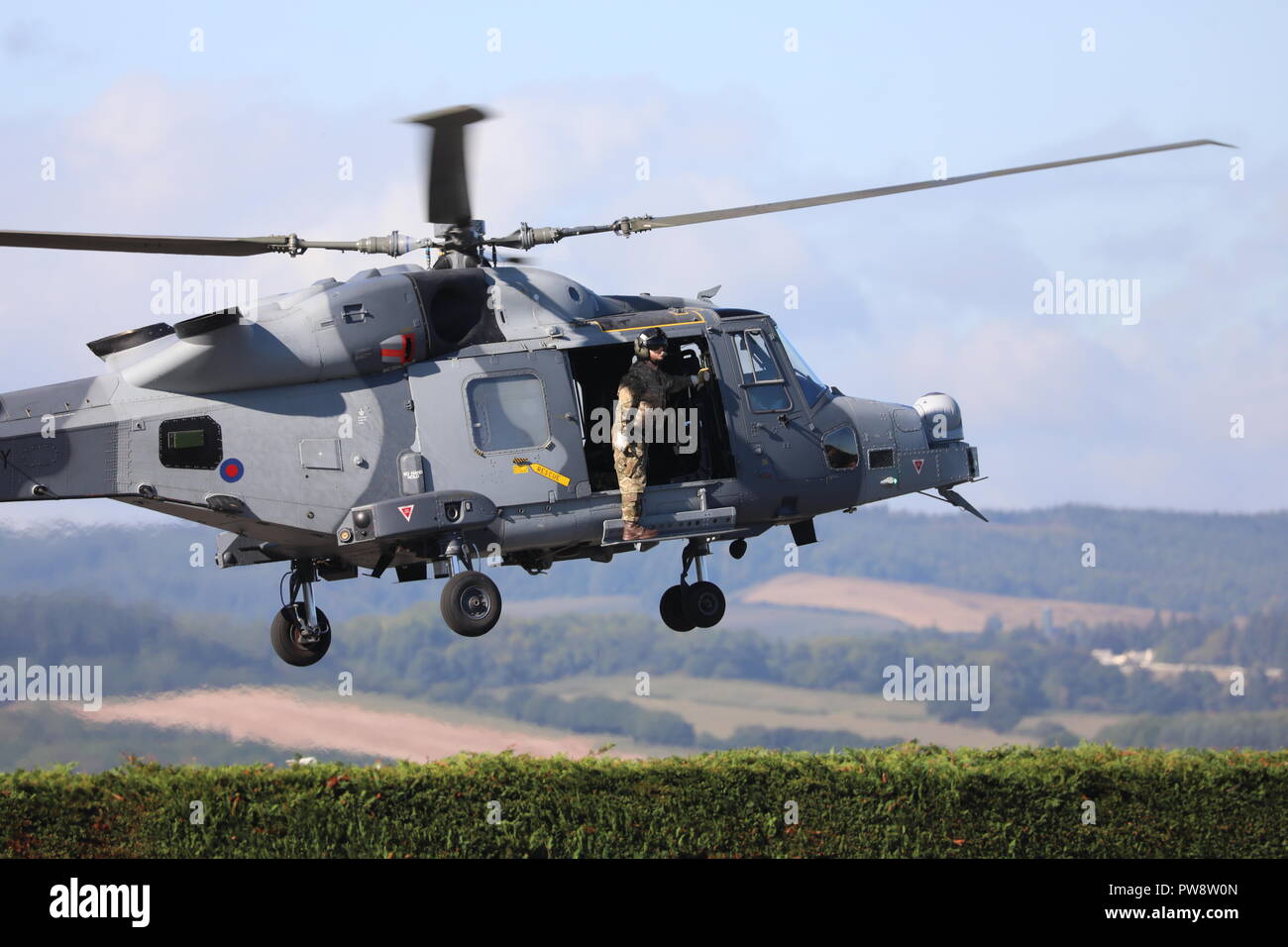 Prince Harry arrives by helicopter at Commando Training Centre Royal ...