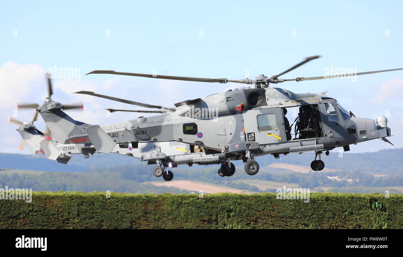 Prince Harry arrives by helicopter at Commando Training Centre Royal ...