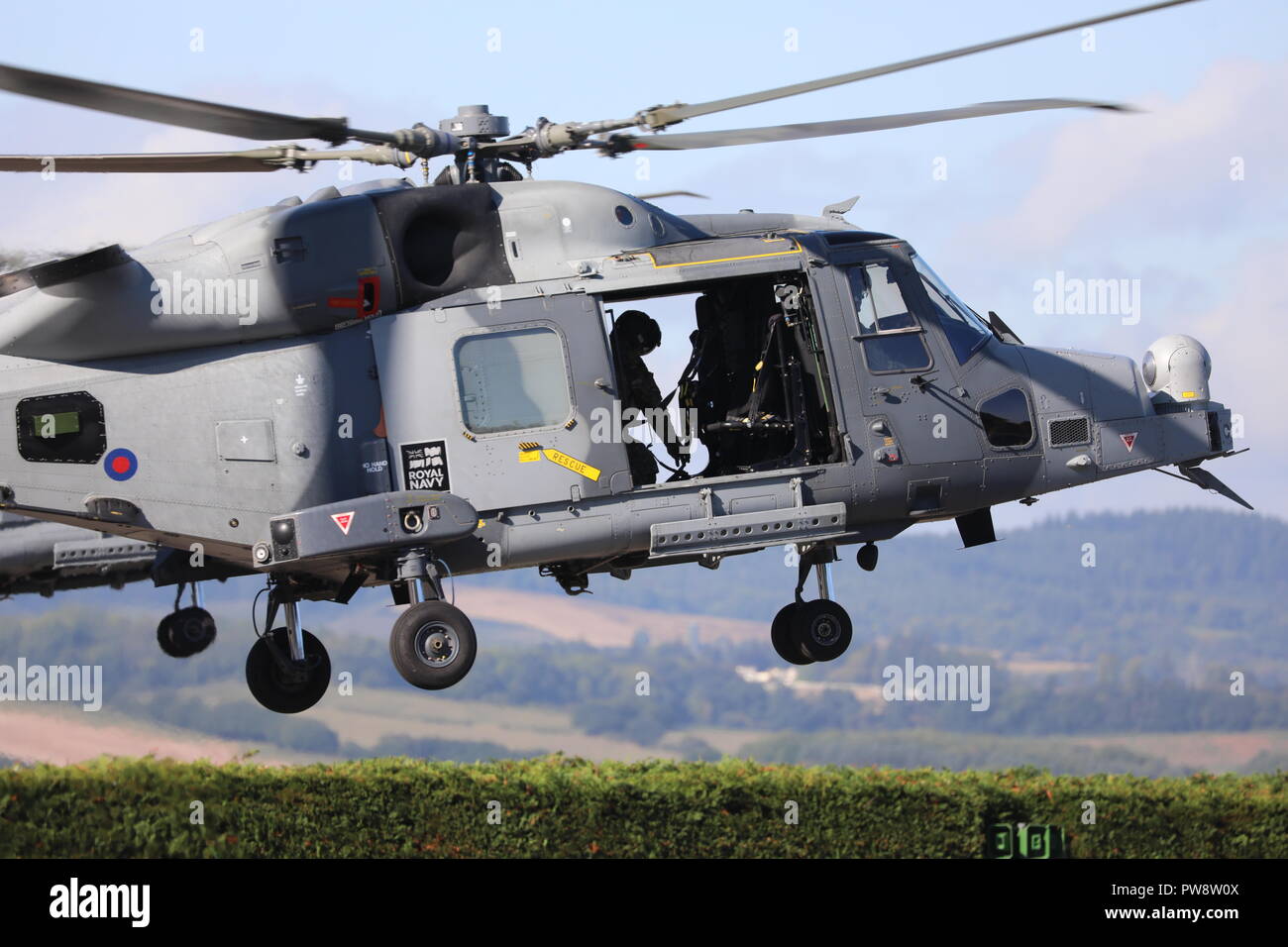Prince Harry arrives by helicopter at Commando Training Centre Royal ...