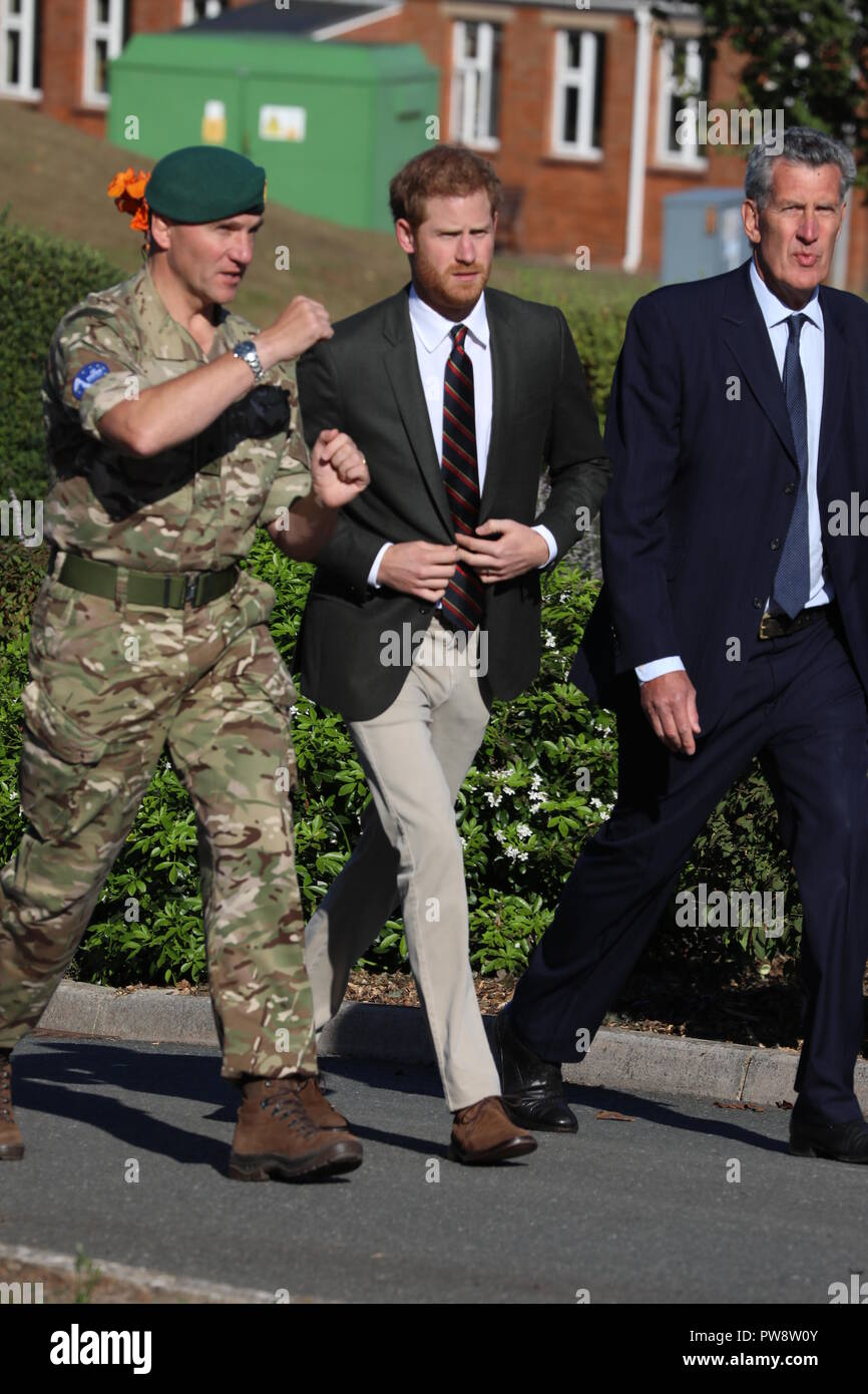 Prince Harry arrives by helicopter at Commando Training Centre Royal ...