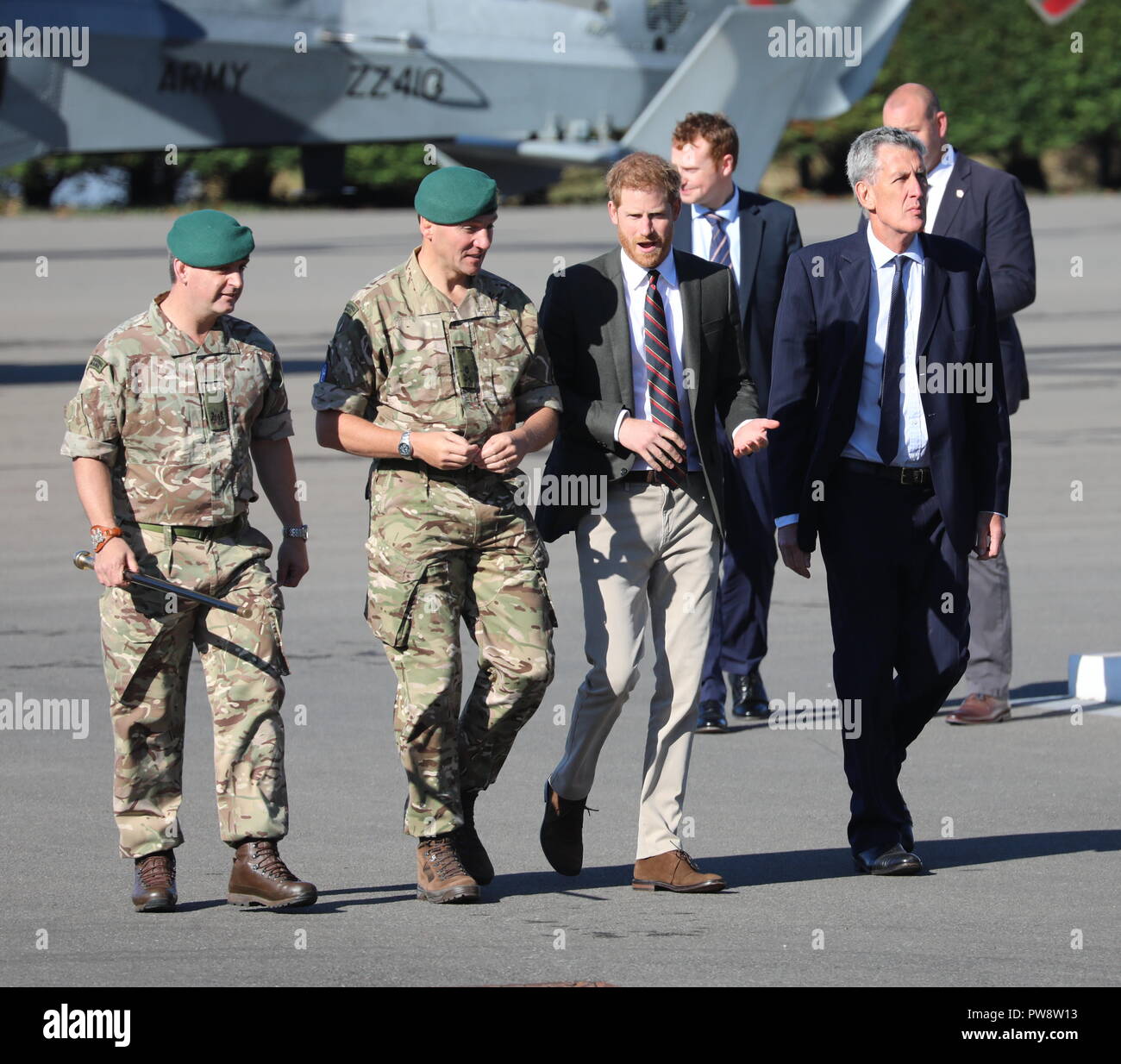 Prince Harry arrives by helicopter at Commando Training Centre Royal ...