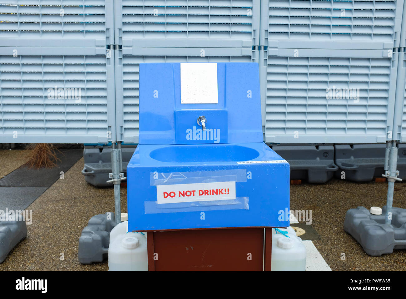 An outdoor sink with a sign warning people not to drink the water Stock ...