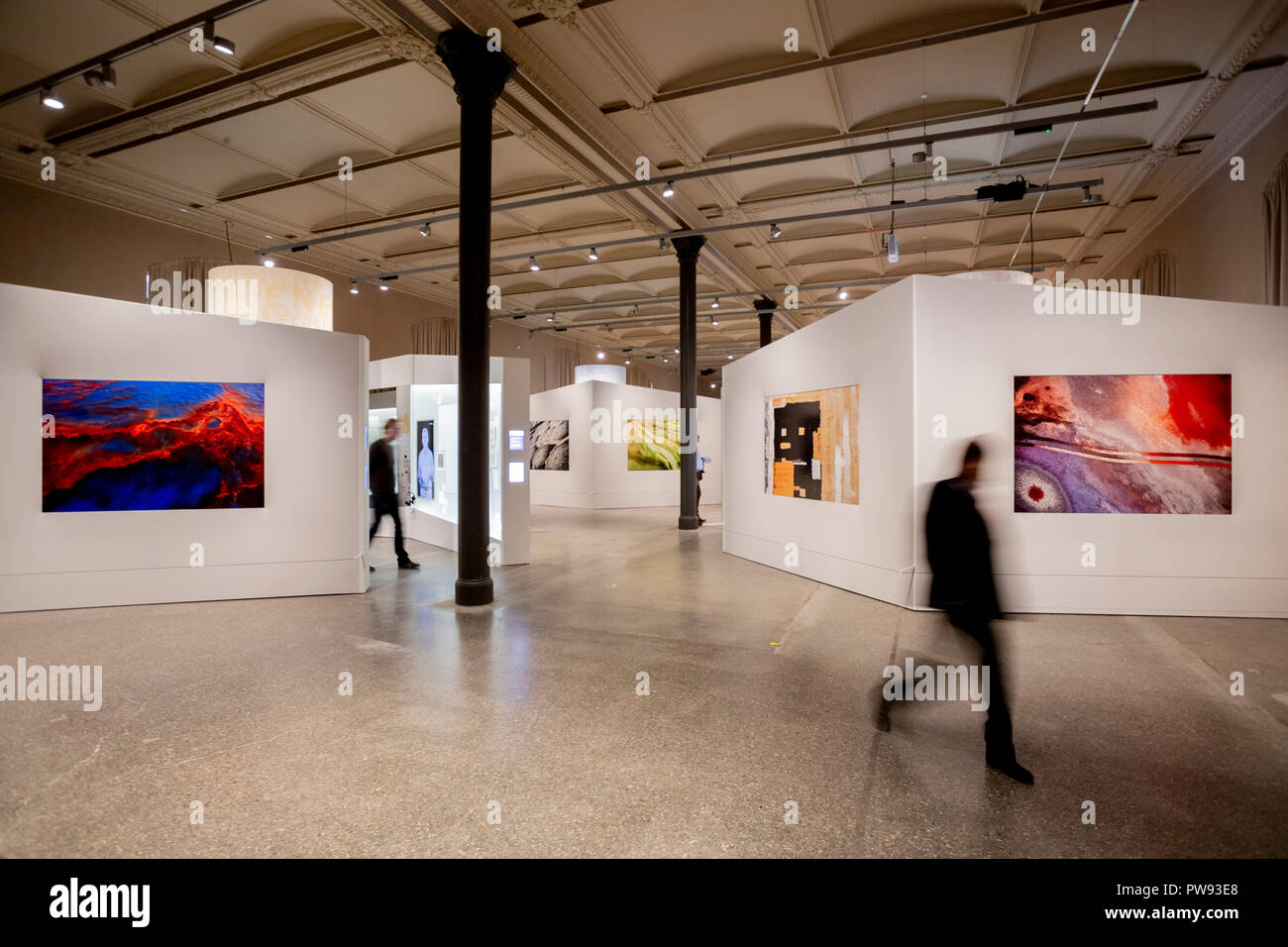 10 October 2018, Berlin: Pictures by photographer J. Henry Fair hanging ...