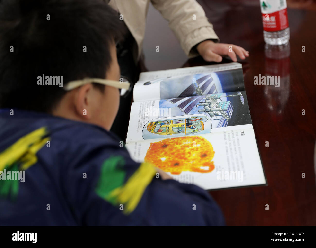Shanghai, China. 14th Oct, 2018. A child with attention-deficit ...
