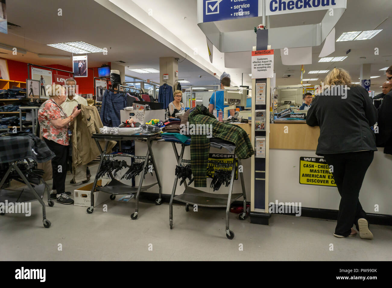 New York, USA. 14th Oct, 2018. Customers at the checkout in the soon to ...