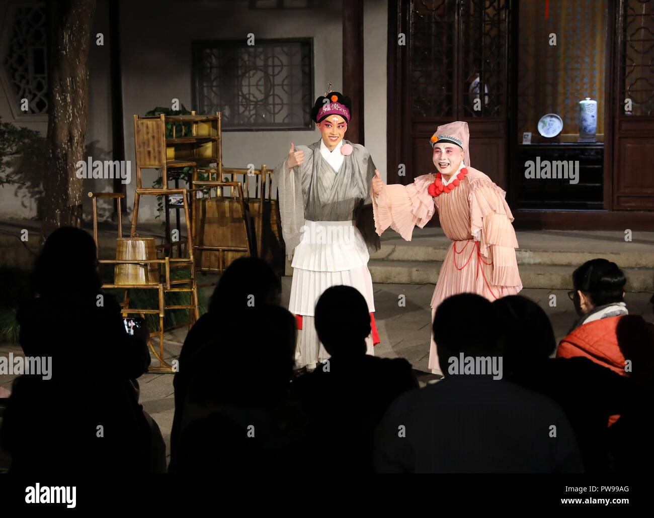 Suzhou, China's Suzhou Province. 14th Oct, 2018. Performers stage an ...