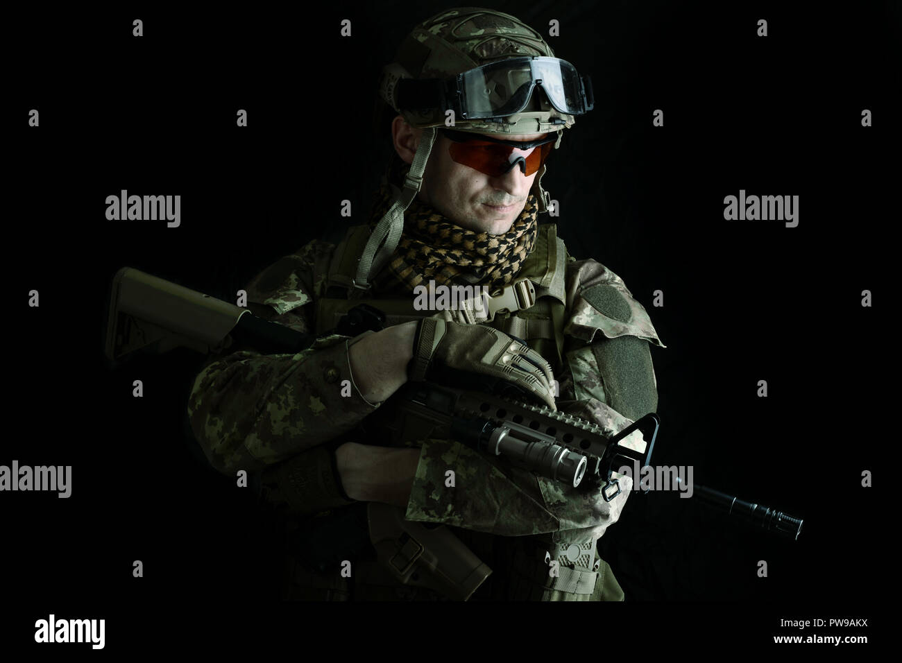 close up portrait of handsome military man. Macro shot on black ...
