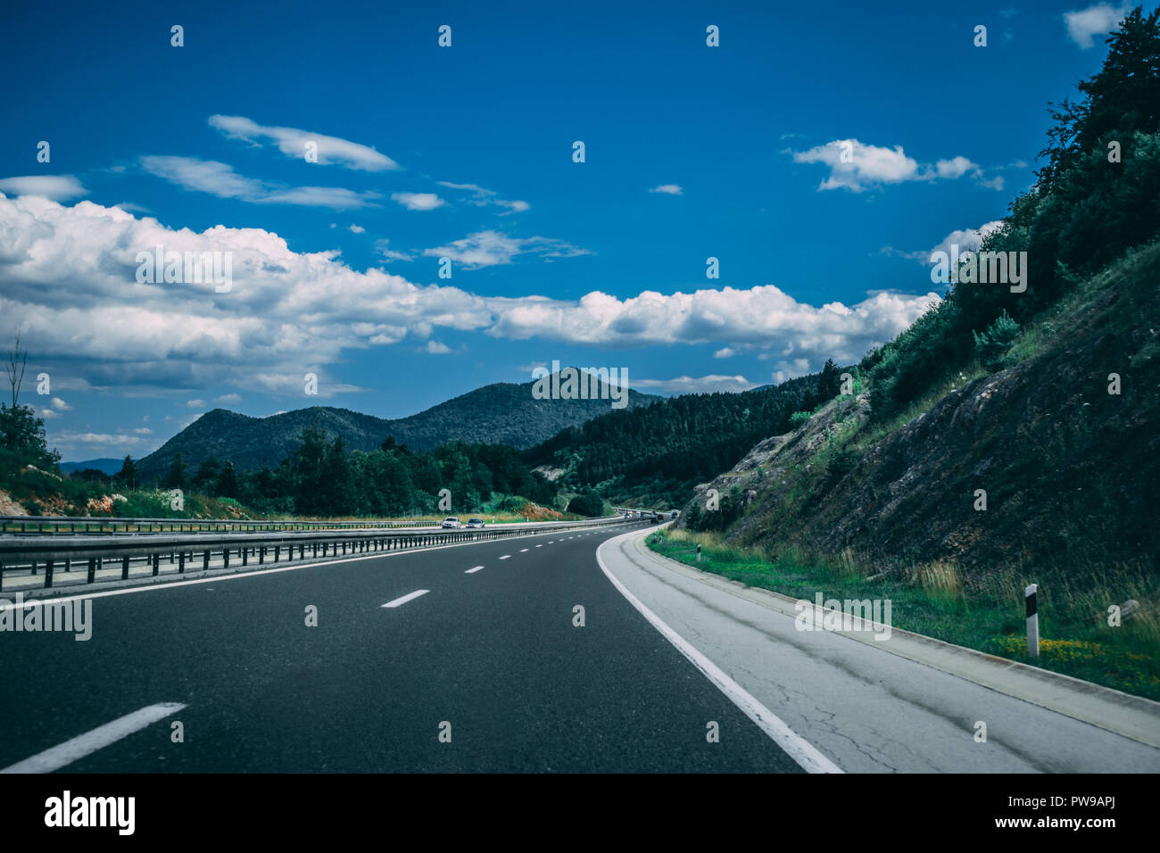 Highway through the mountains High Resolution Stock Photography and ...