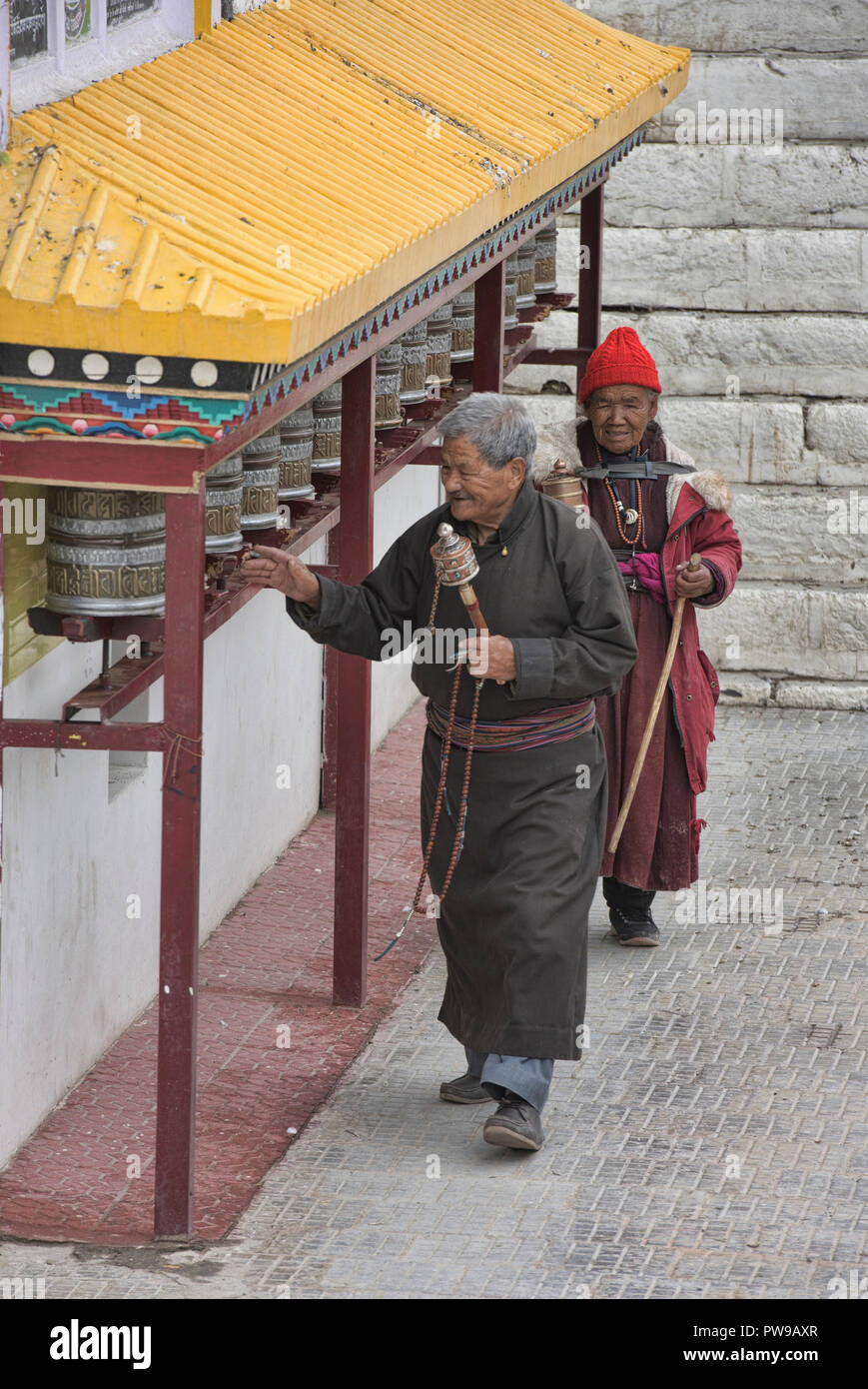 Ladakhi pilgrims spinning prayer wheels, Leh, Ladakh, India Stock Photo ...