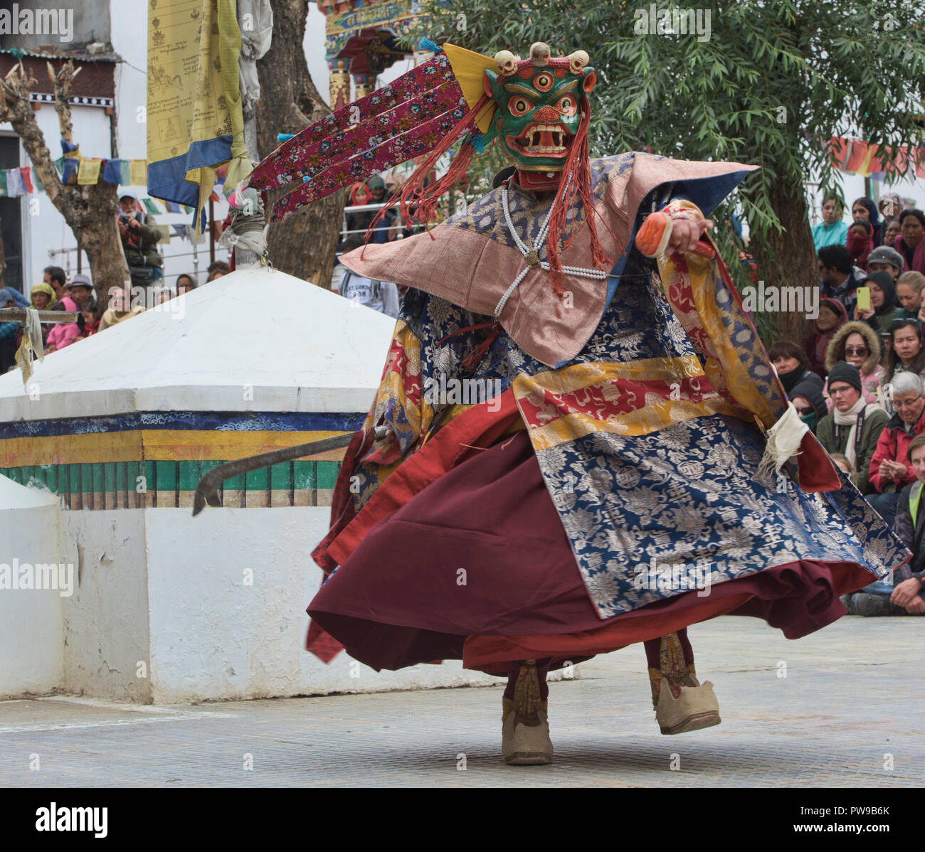 A masked monk dances at a traditional Tibetan Buddhist Cham dance , Leh ...