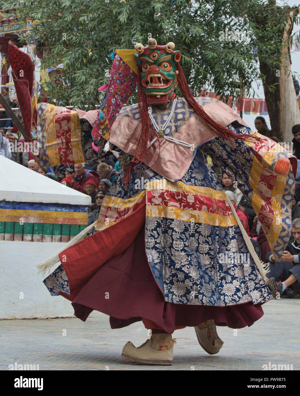 A masked monk dances at a traditional Tibetan Buddhist Cham dance , Leh ...