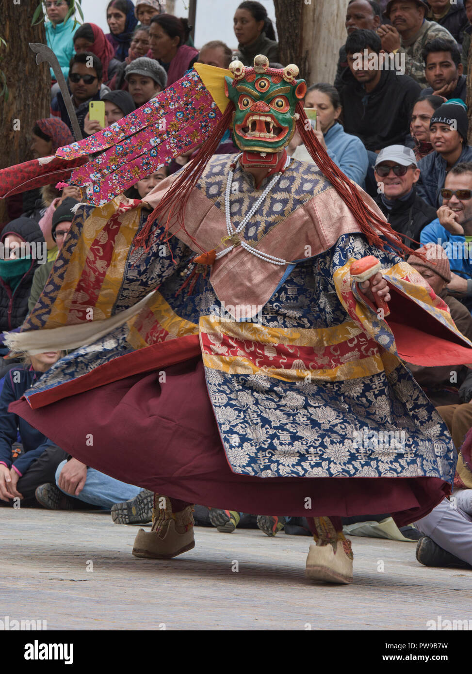 A masked monk dances at a traditional Tibetan Buddhist Cham dance , Leh ...