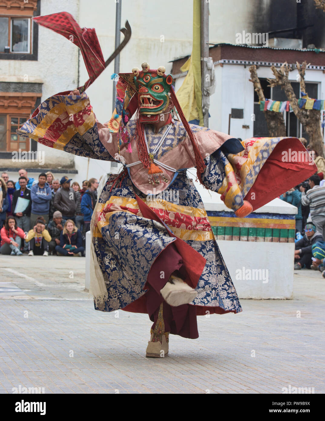A masked monk dances at a traditional Tibetan Buddhist Cham dance , Leh ...