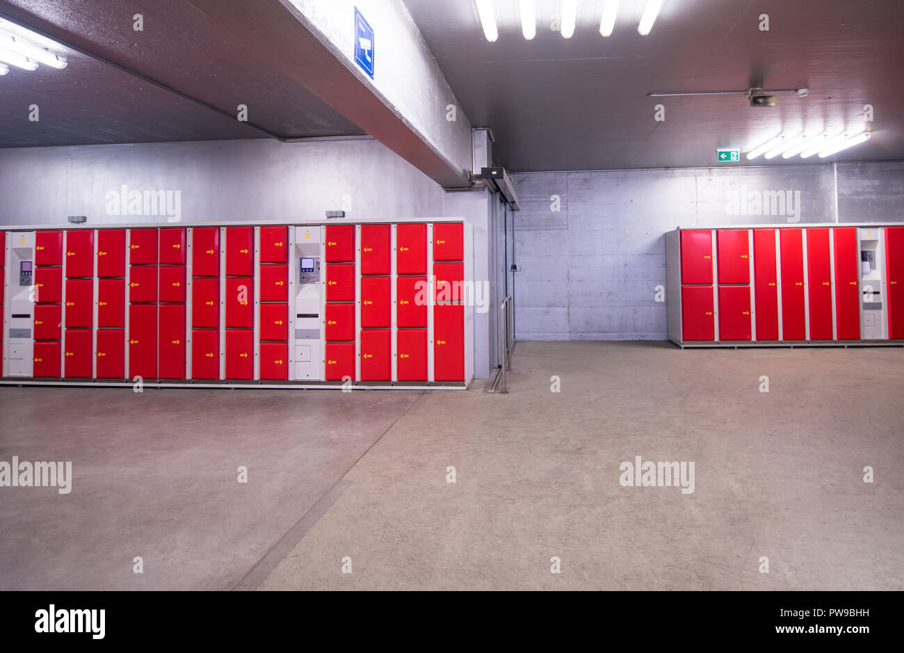 red safety lockers in empty Lockers Room Stock Photo - Alamy