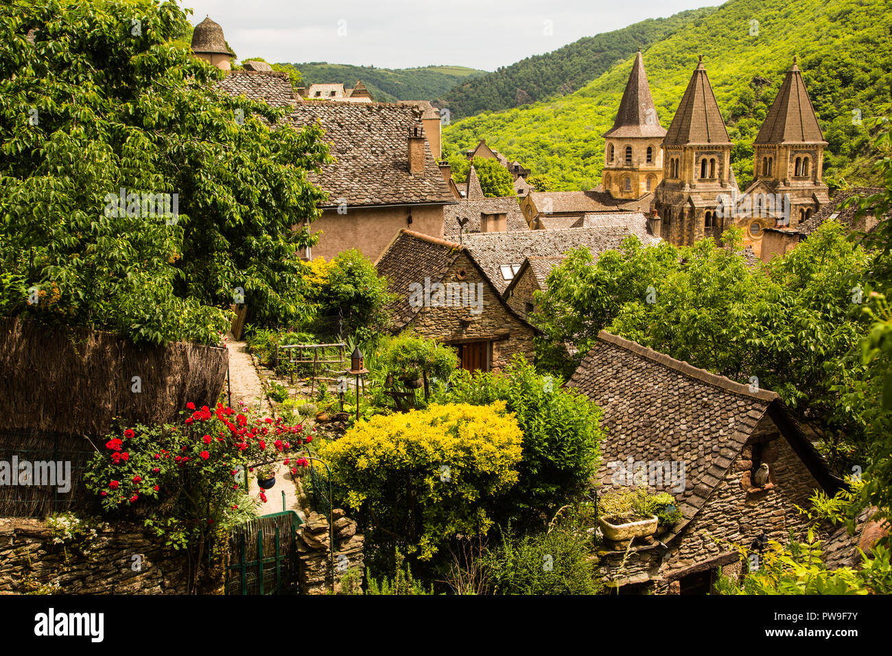 The medieval village of Conques in France. For centuries pilgrims have ...