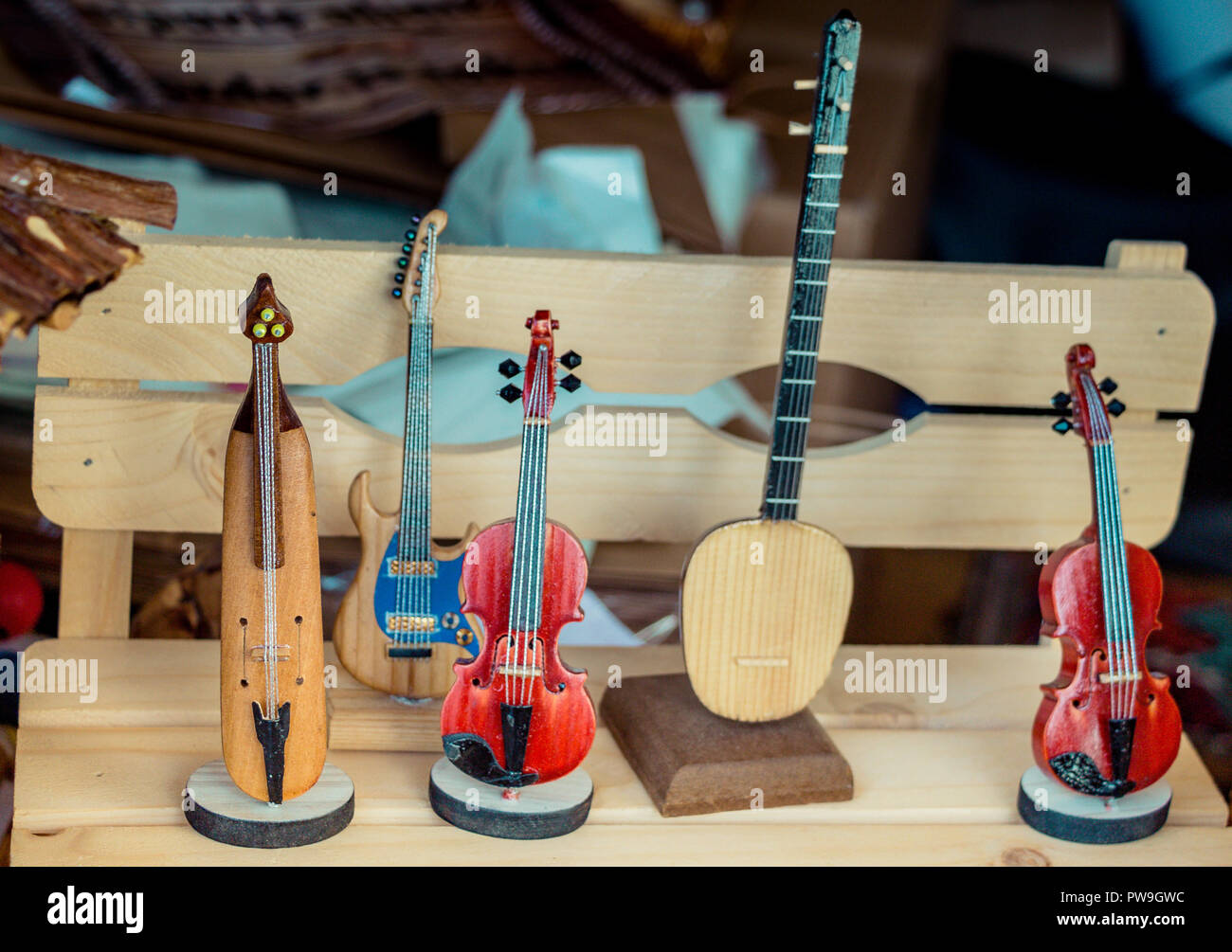 Set of models of musical instruments made of wood Stock Photo - Alamy