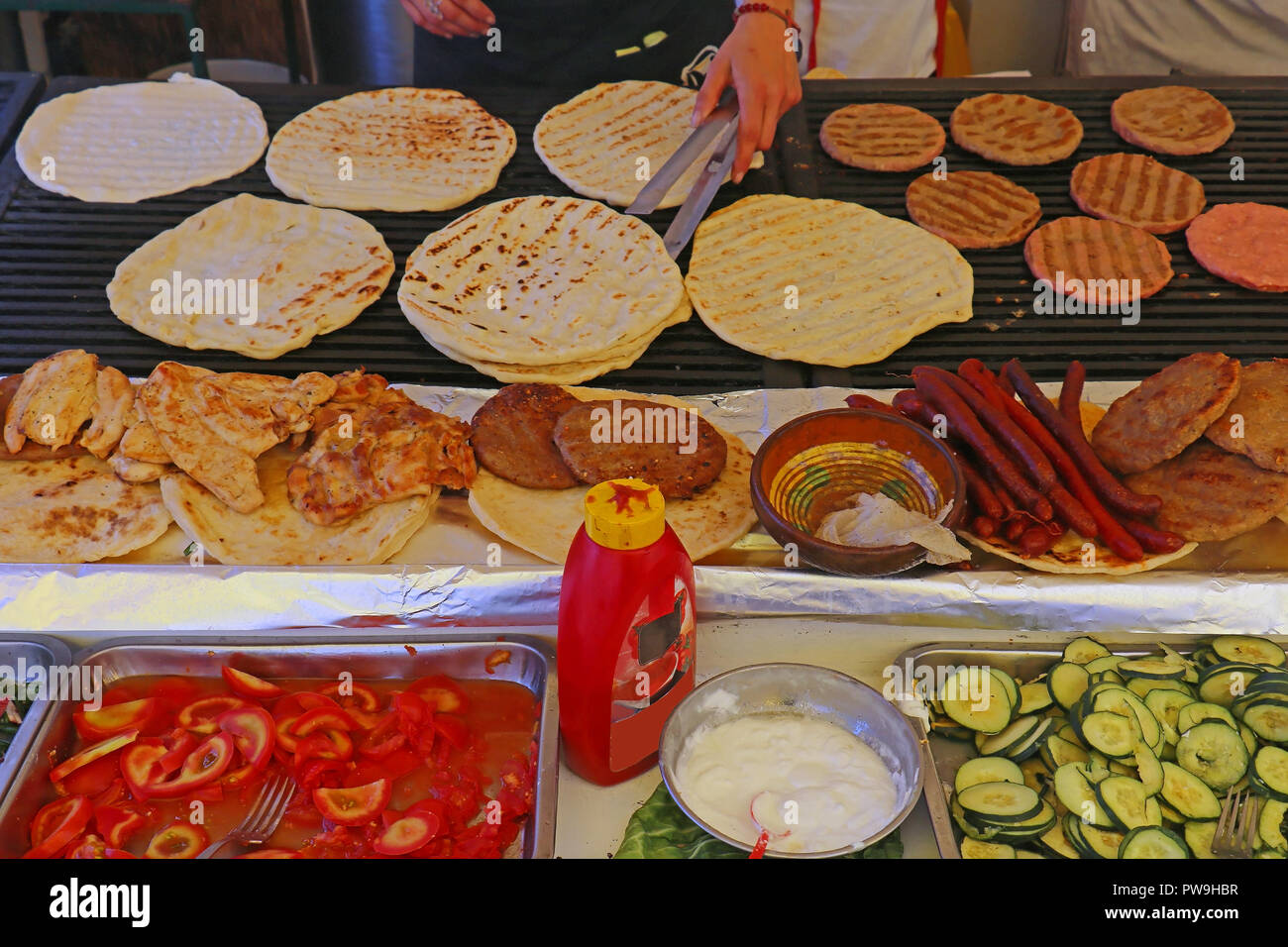Grilled meat fast food stand on urban street Stock Photo - Alamy