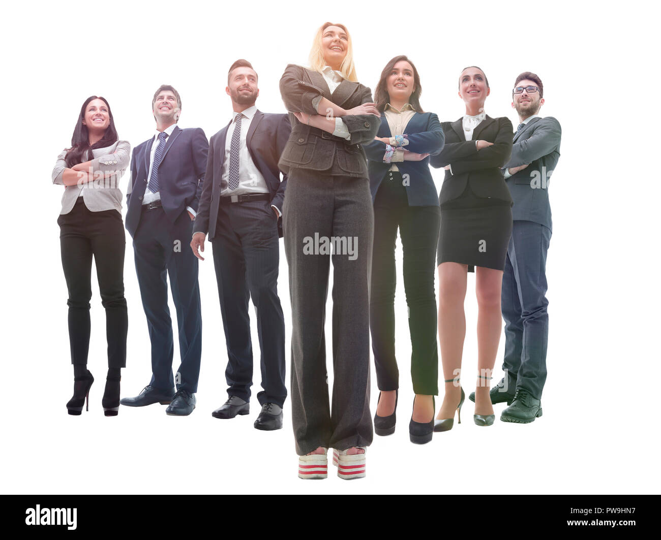 Portrait of friendly business team standing in isolation Stock Photo ...