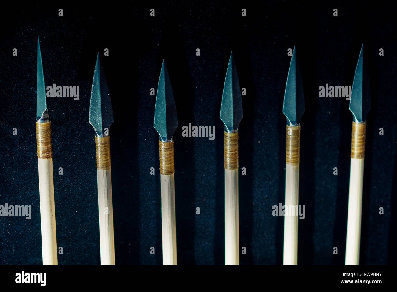 Antique old wooden arrows Stock Photo - Alamy