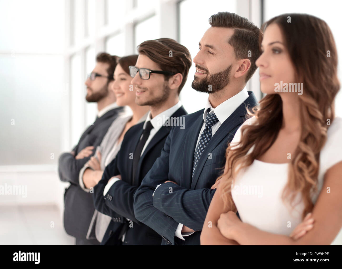 young business team standing in a row Stock Photo - Alamy