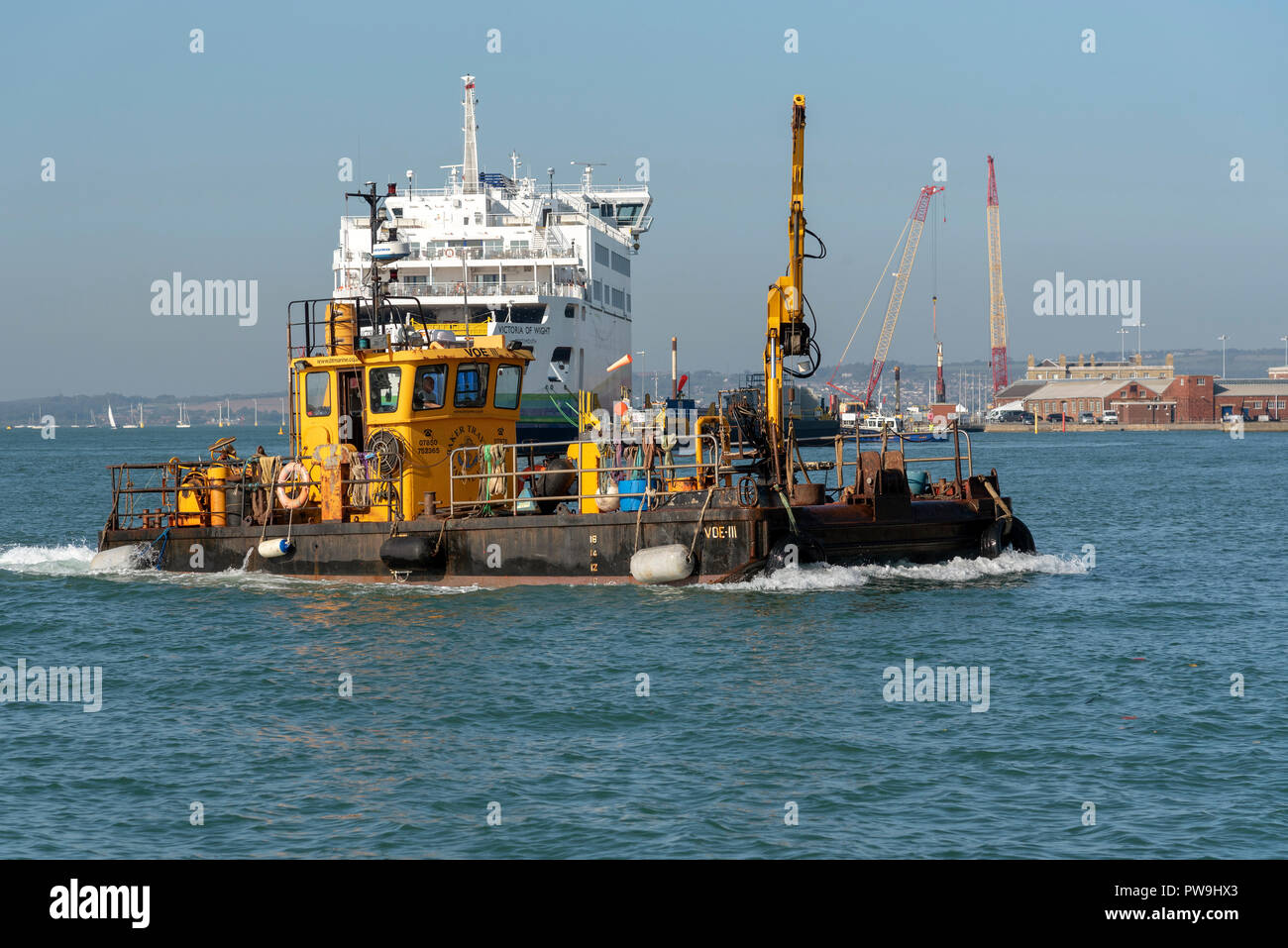 Portsmouth Harbour, England UK. A multi cat vessel, VOS 3 crossing ...