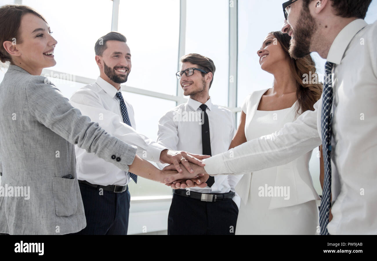 business team putting their hands together Stock Photo - Alamy