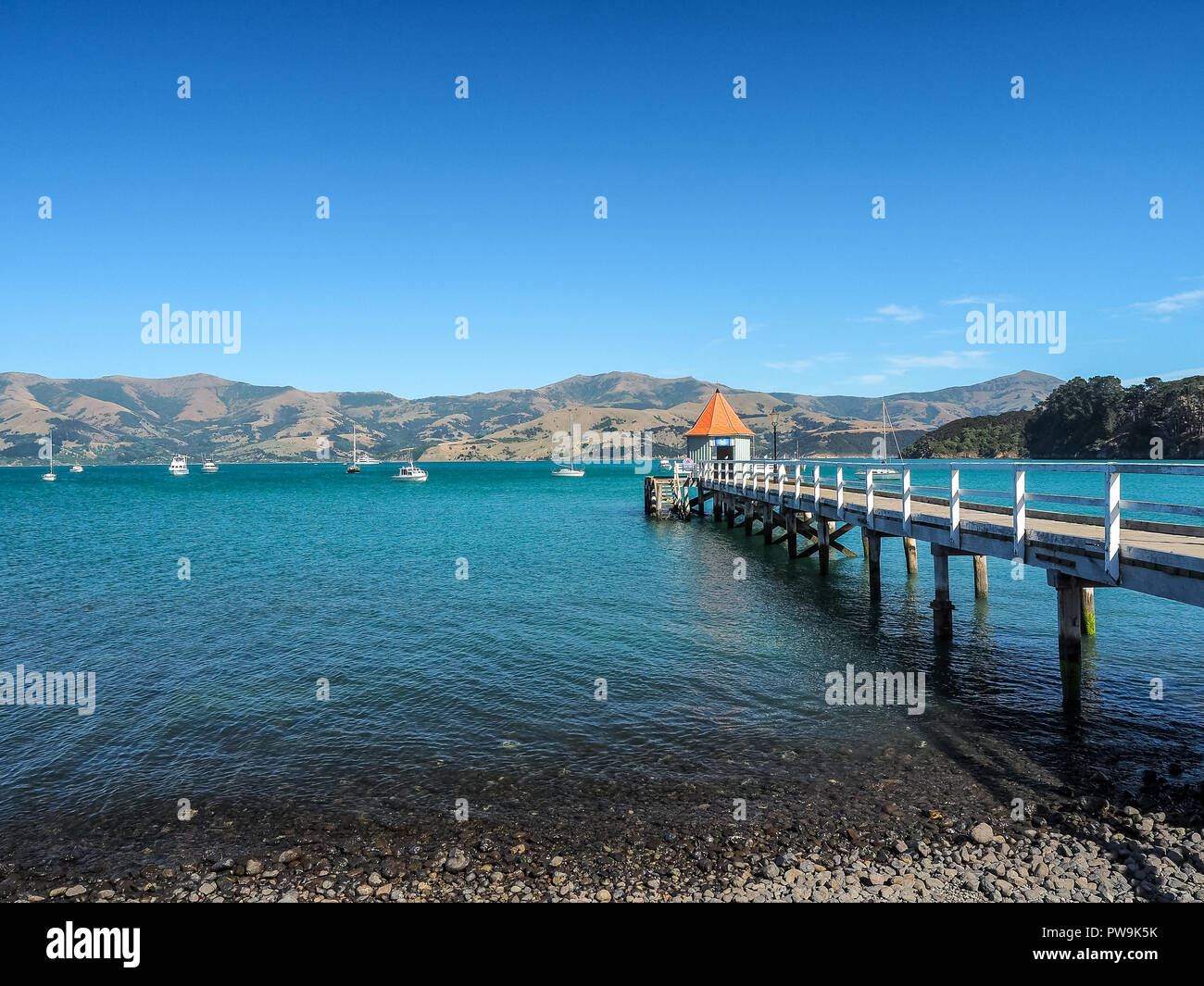 The wooden wharf at Akaroa Harbour in New Zealand Stock Photo - Alamy