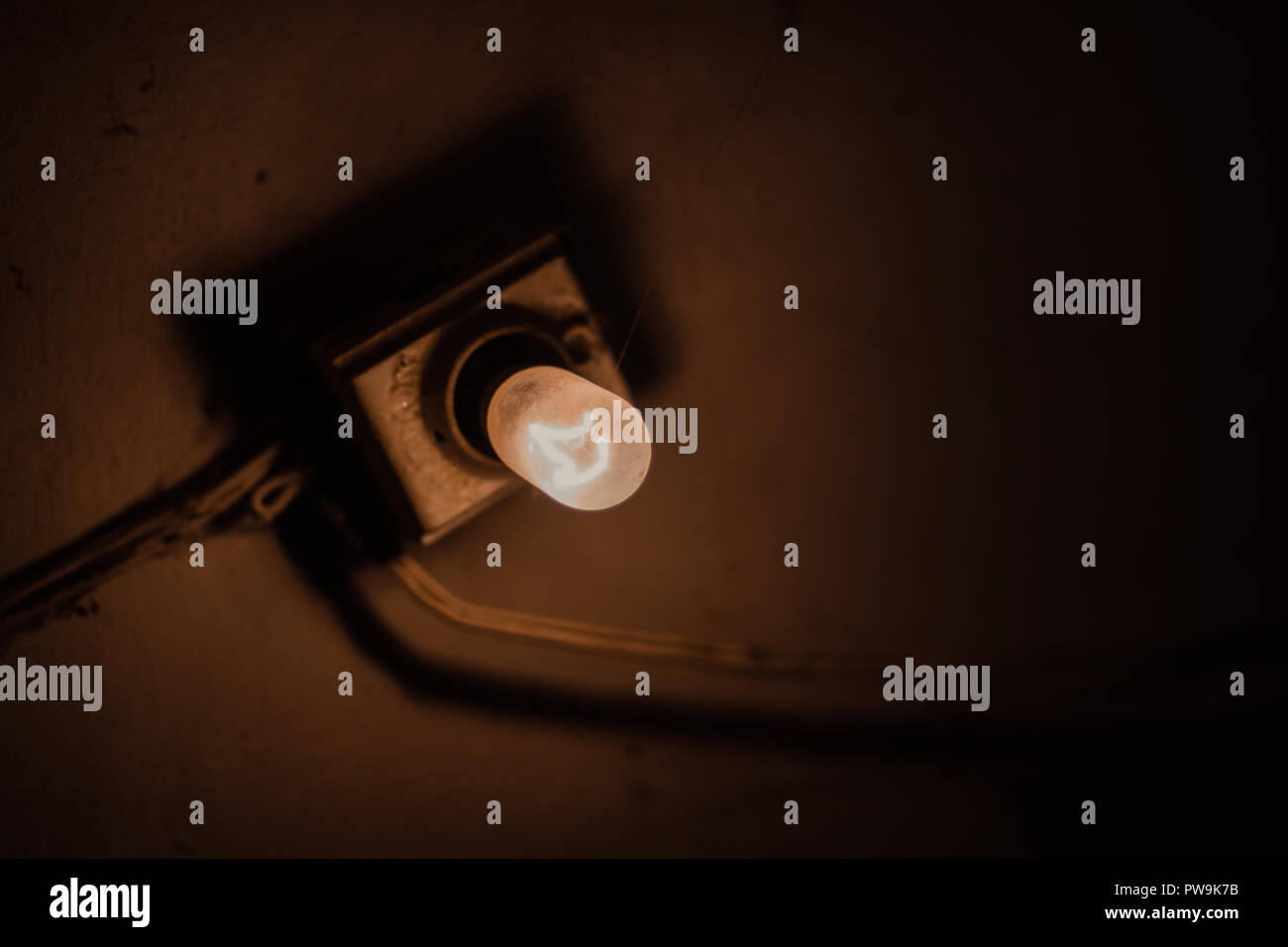 Light bulb with wire Stock Photo - Alamy