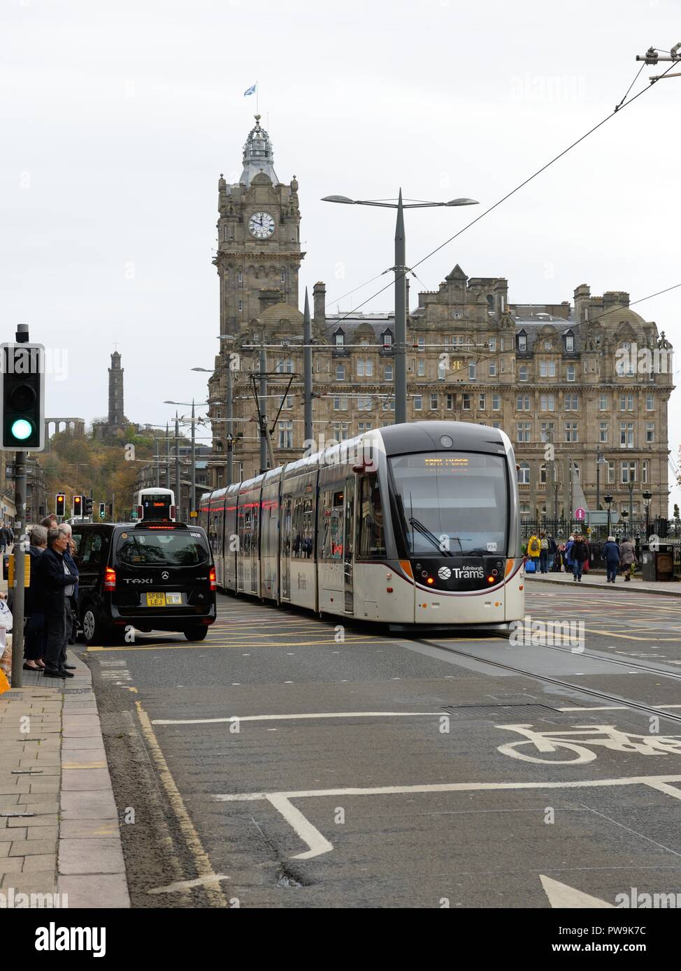 An Edinburgh tram proceeding east along Princes street in Edinburgh ...
