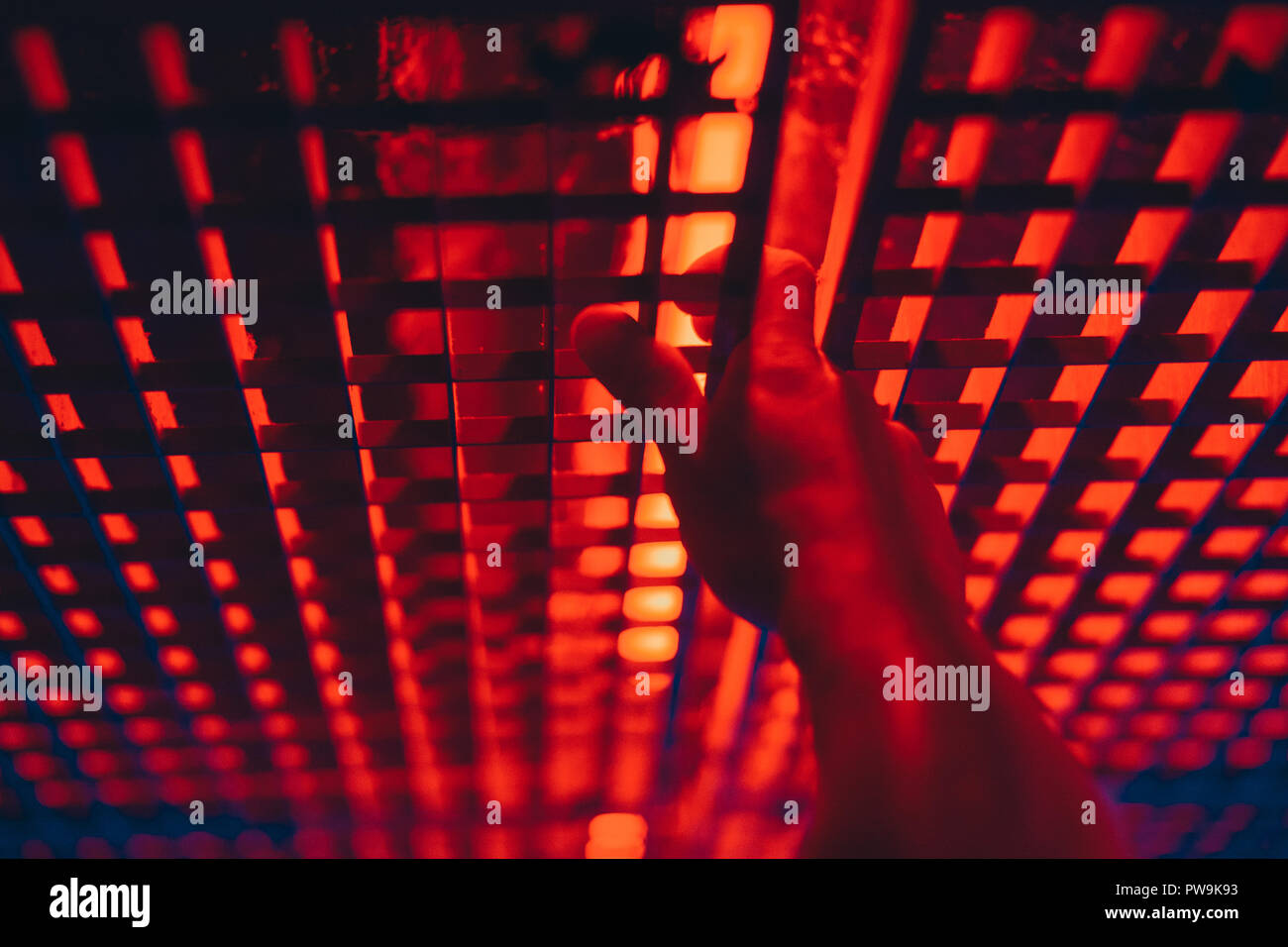 hand on a grid red light Stock Photo - Alamy