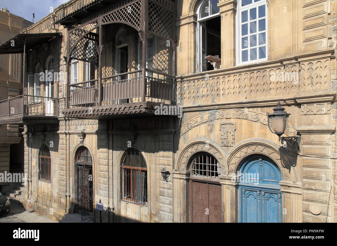 Azerbaijan; Baku, Old City, street scene, balconies, historic ...