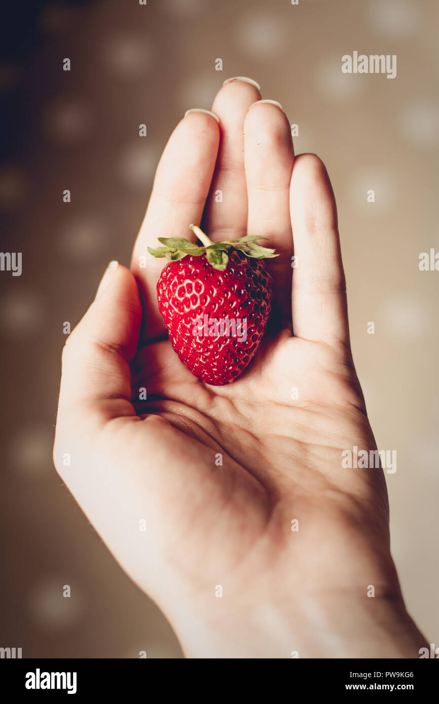 Strawberry Pastel Hand Stock Photo - Alamy
