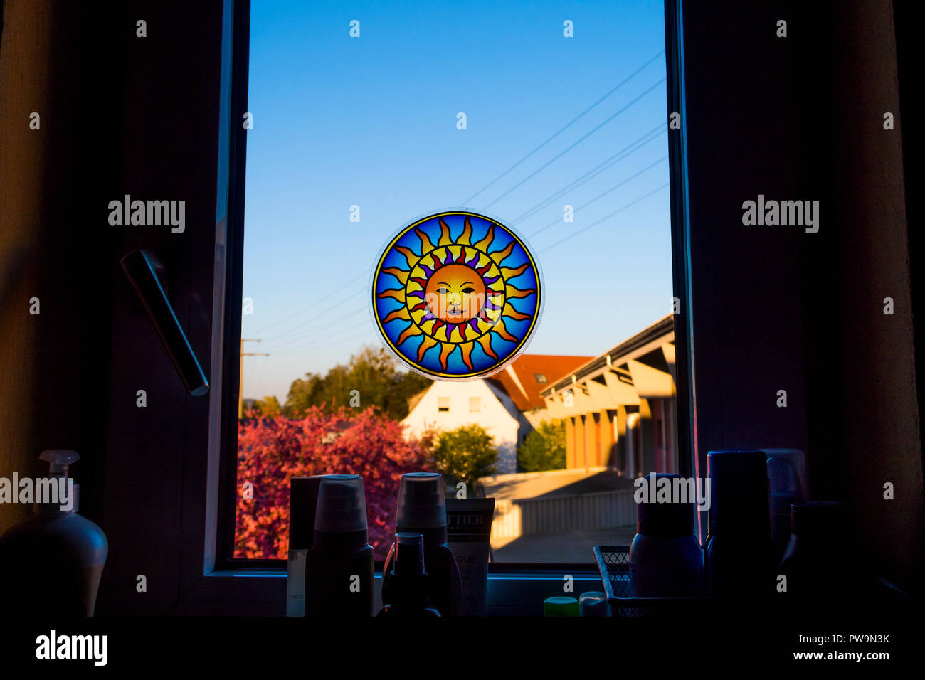 Window with Oriental Sun Sticker Stock Photo - Alamy