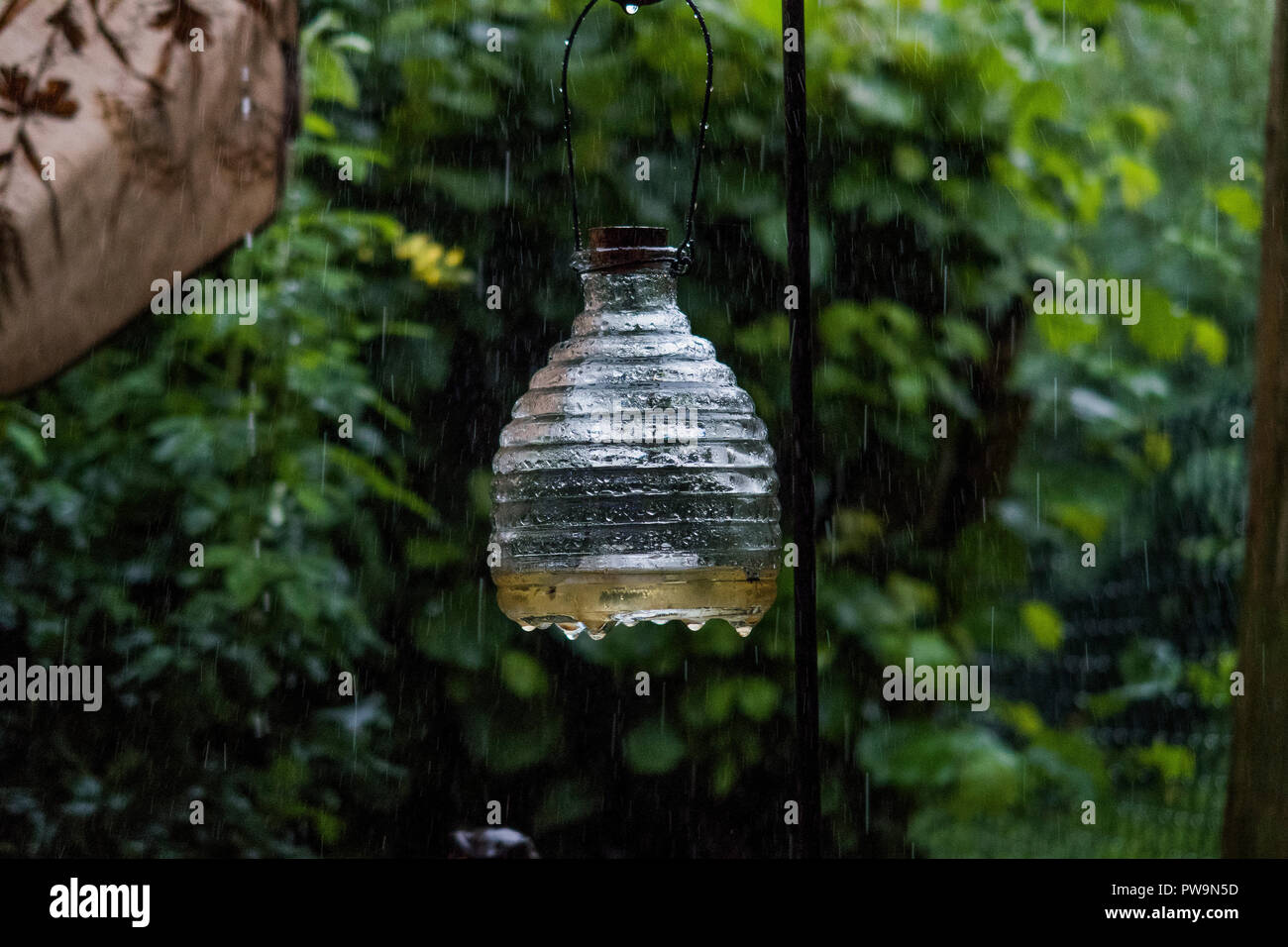 Glass decoration in the rain Stock Photo - Alamy
