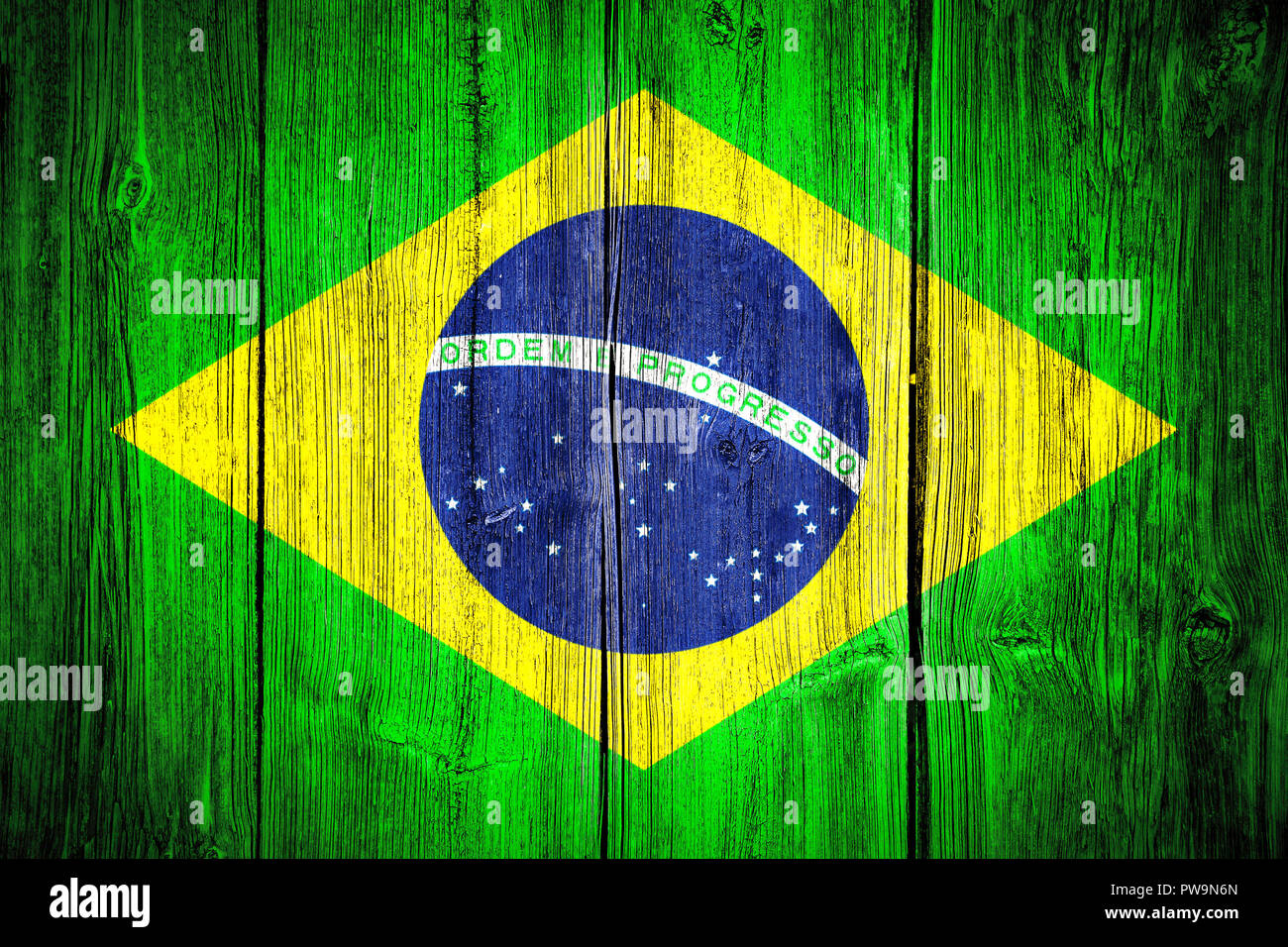 Brazil national flag over grungy wood wall board with the traditional ...